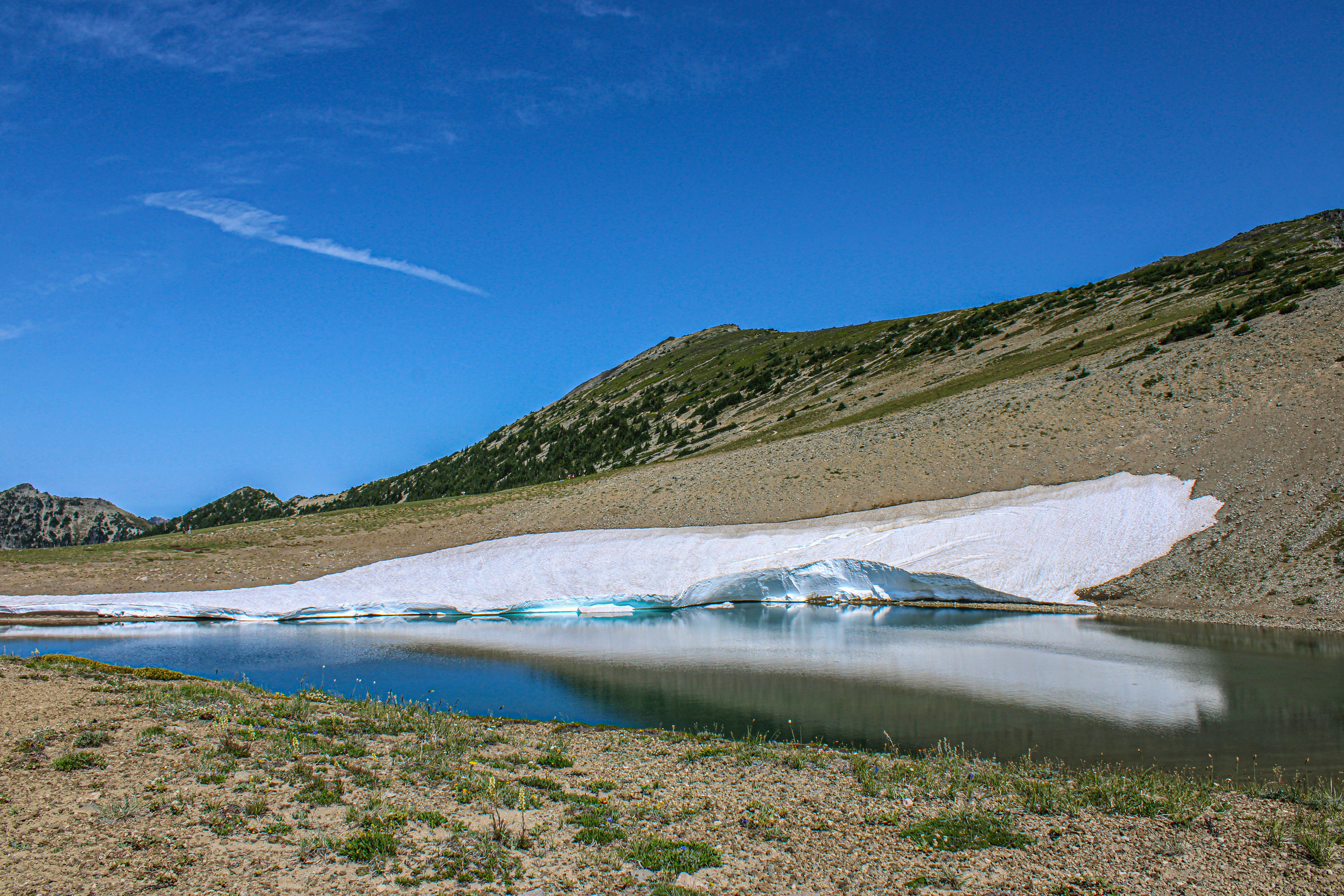 Snowfield Mirage under a Clear Alpine Sky