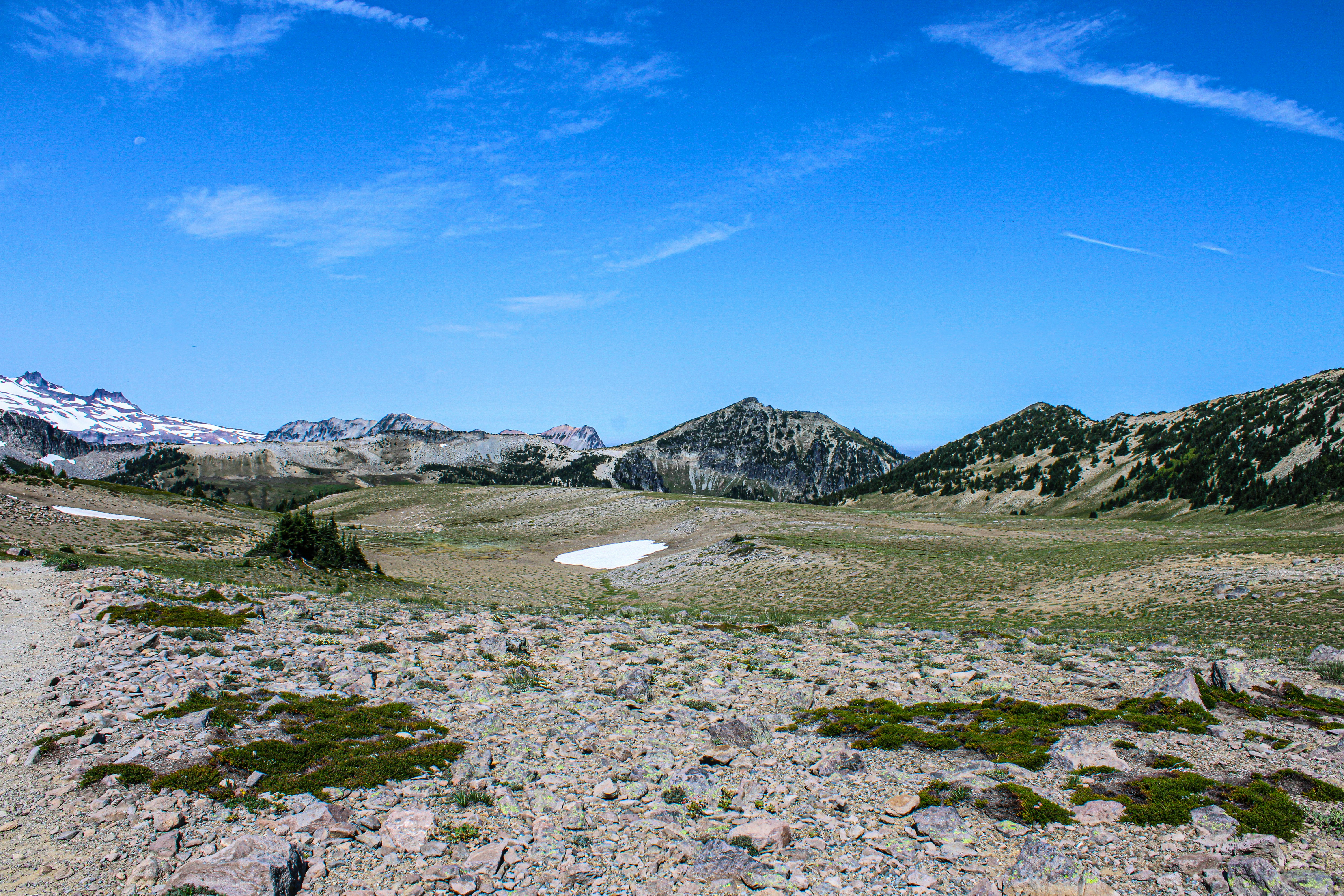 A view of a mountain range from a distance photo – Free Mount rainier ...