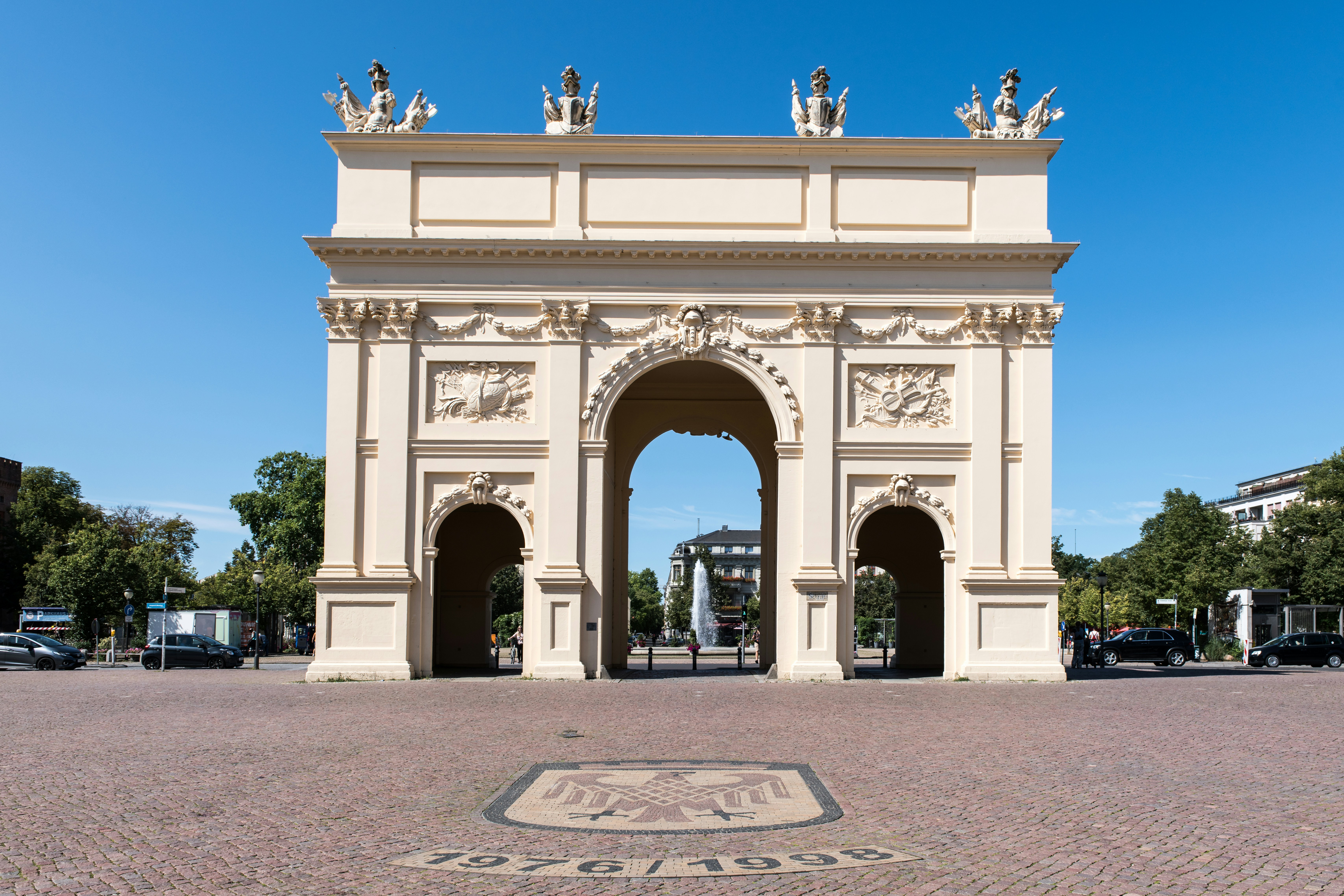 A large white arch with statues on top of it photo – Free Potsdam Image ...