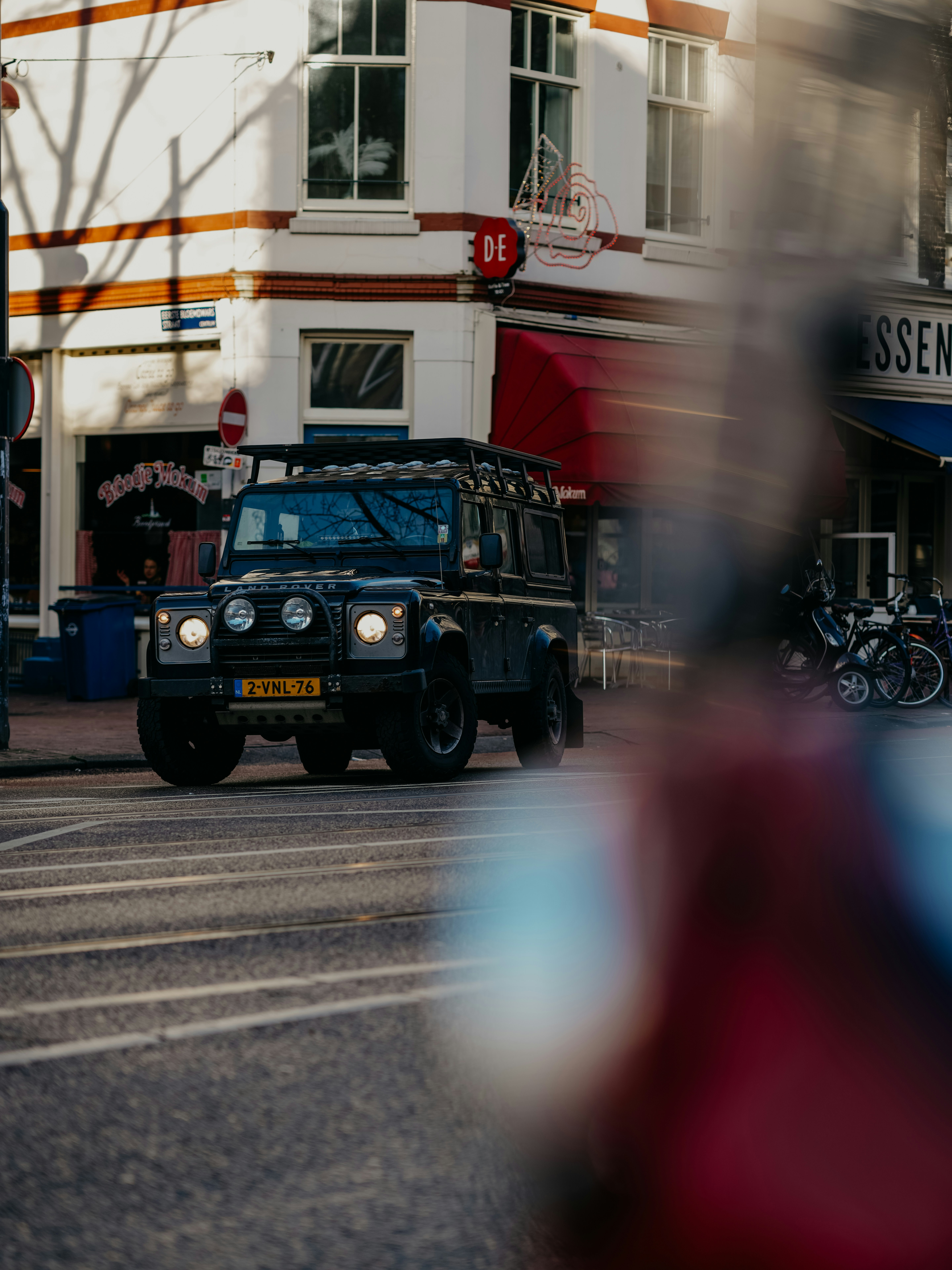Defender at the Crosswalk: A City Street Portrait