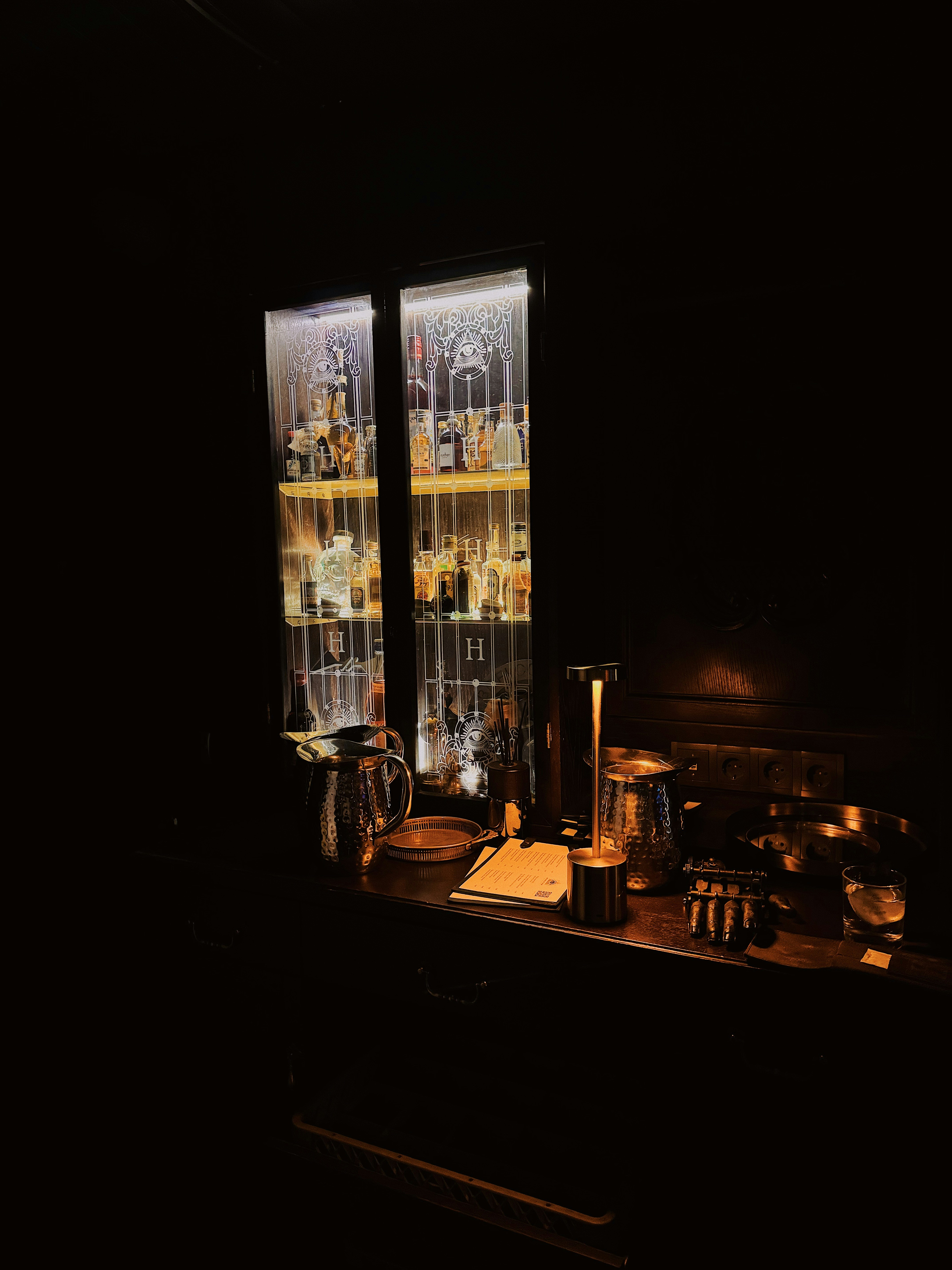 A dimly lit kitchen with a large window photo – Free Furniture Image on ...