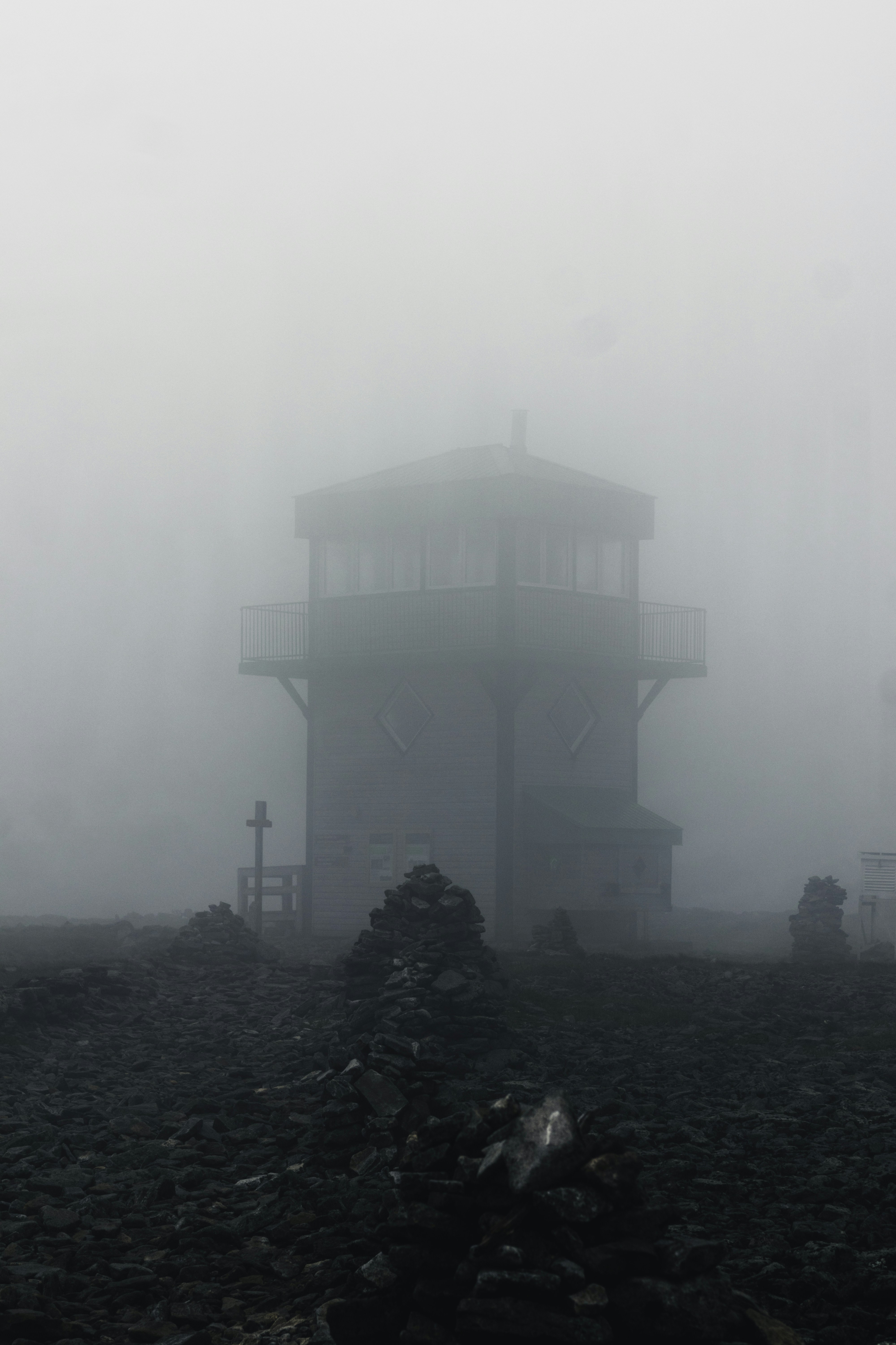 Mistbound Watchtower: Quiet Sentinel Amid a Shrouded Landscape