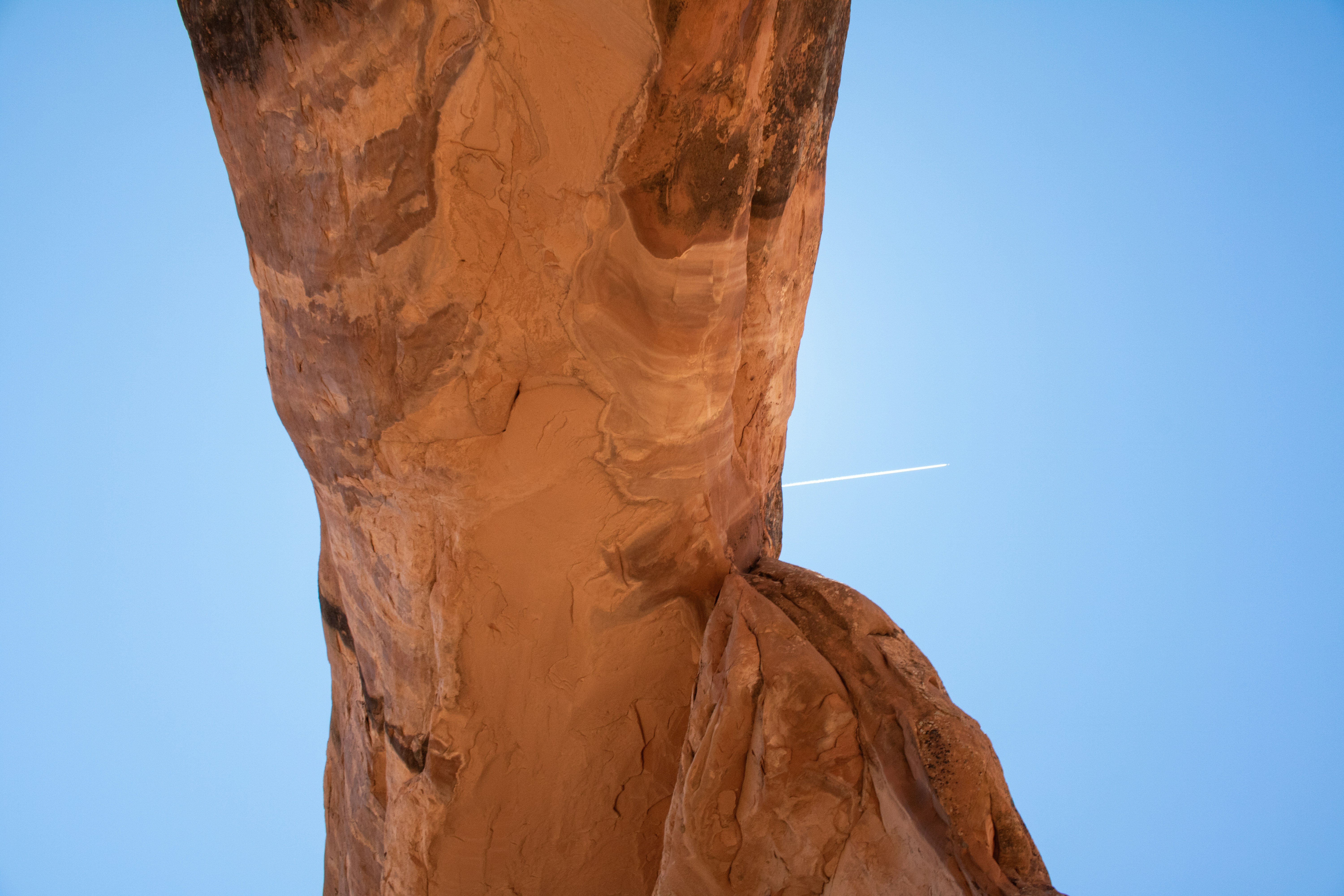 Skyward Spire: A Red Rock Column Piercing the Blue