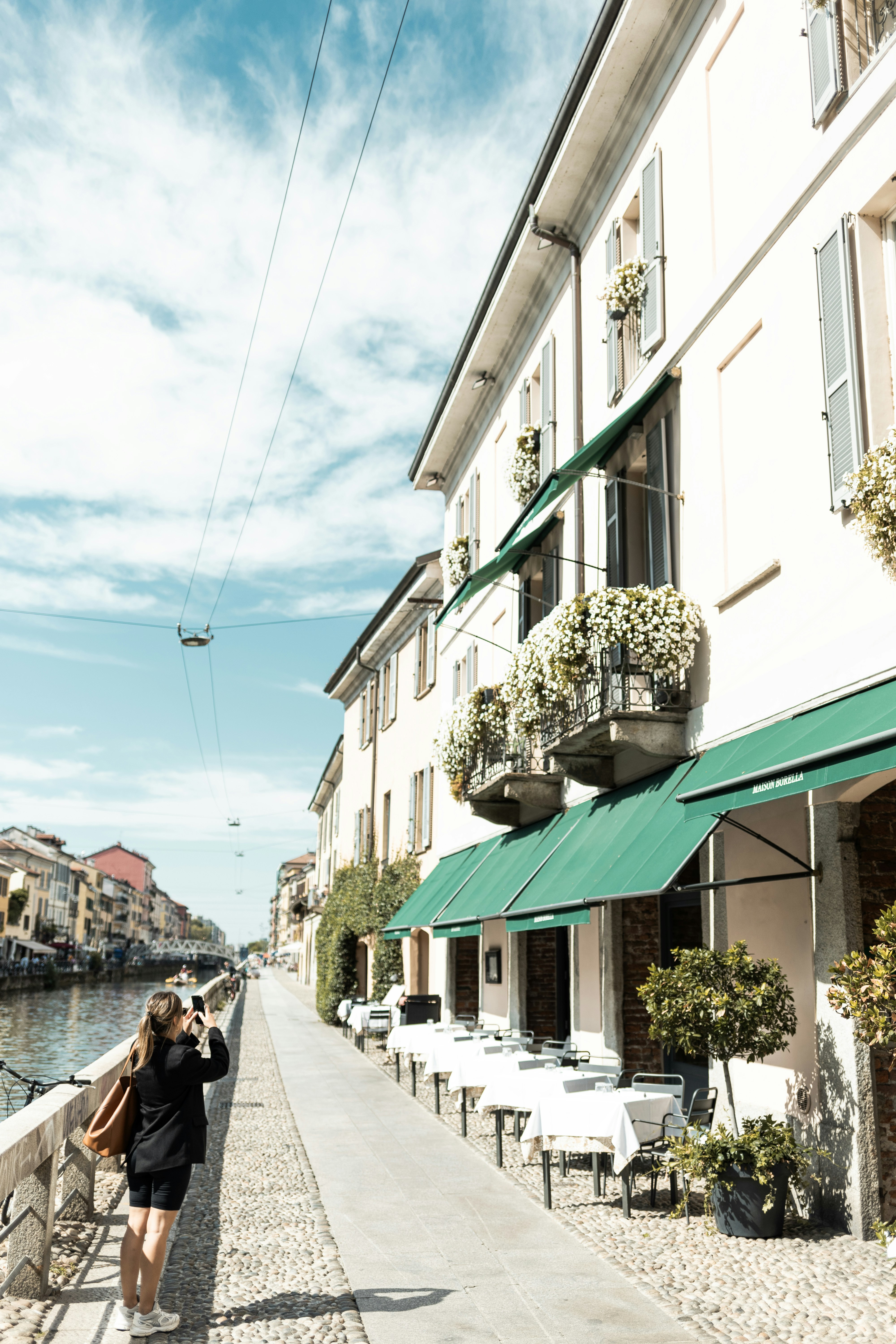 Balconies, Canals, and a Candid Frame: A Photographer Seeks Light Along the Waterfront