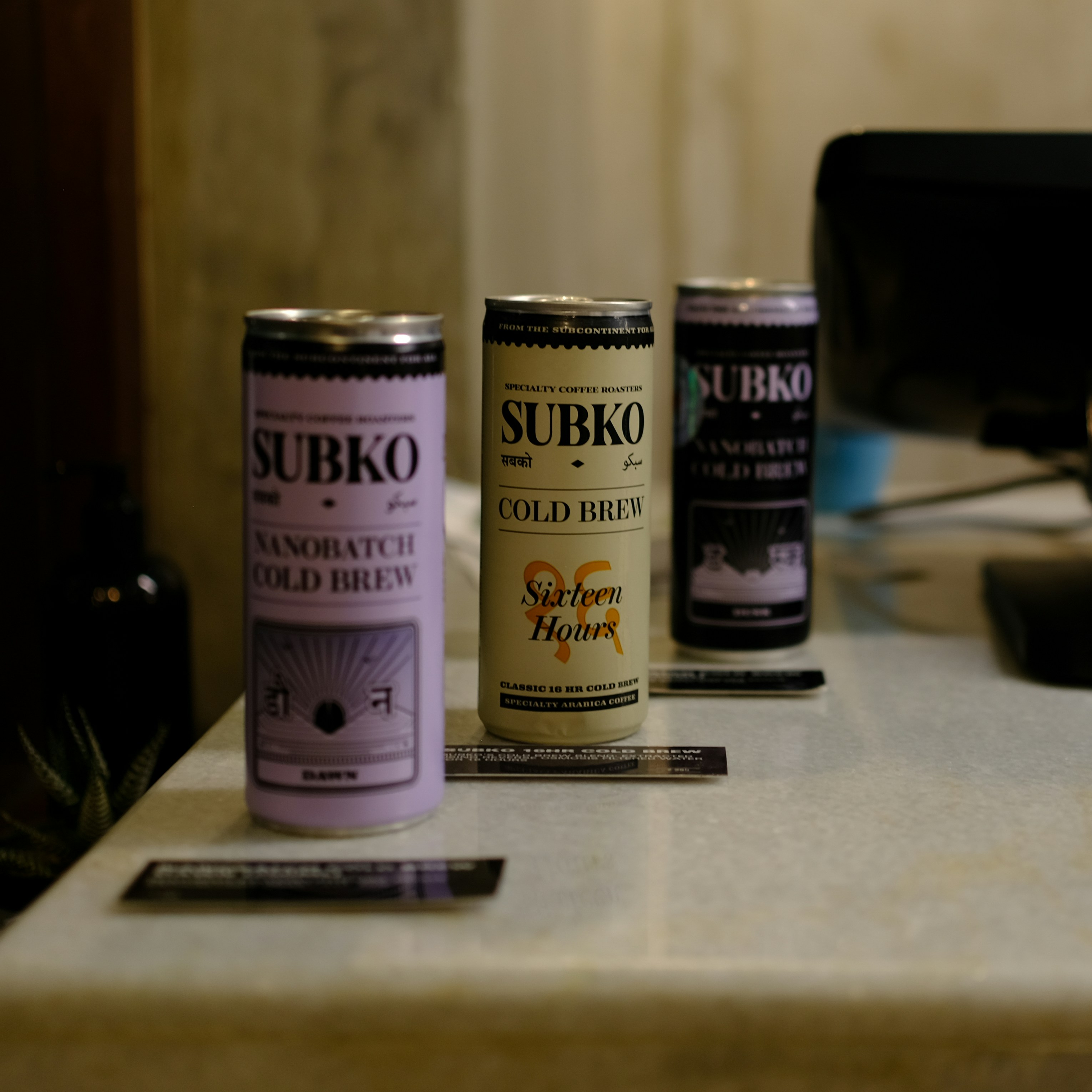 Three cans of beer are sitting on a counter photo – Free India Image on ...
