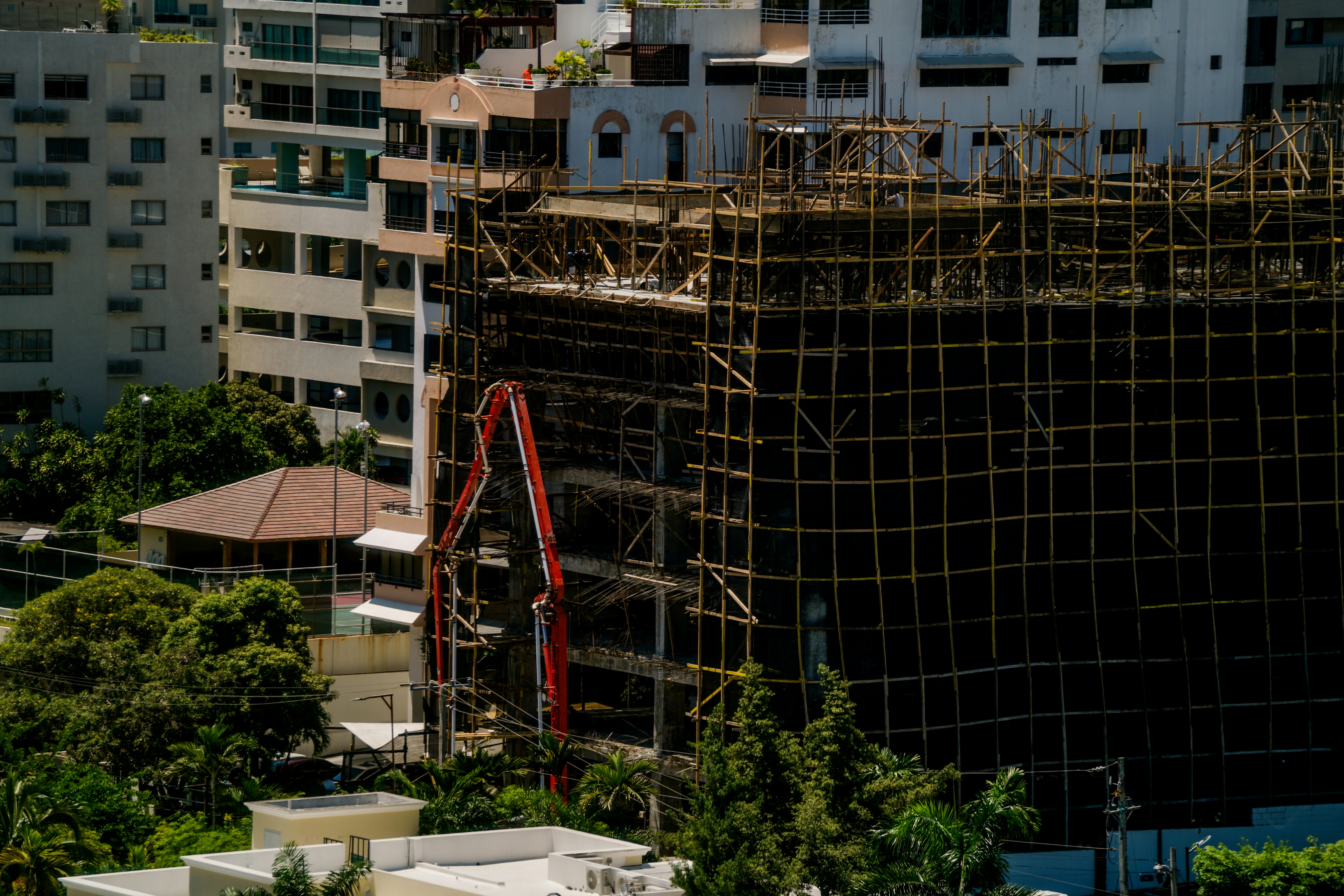 A large building under construction in a city photo – Free Building ...