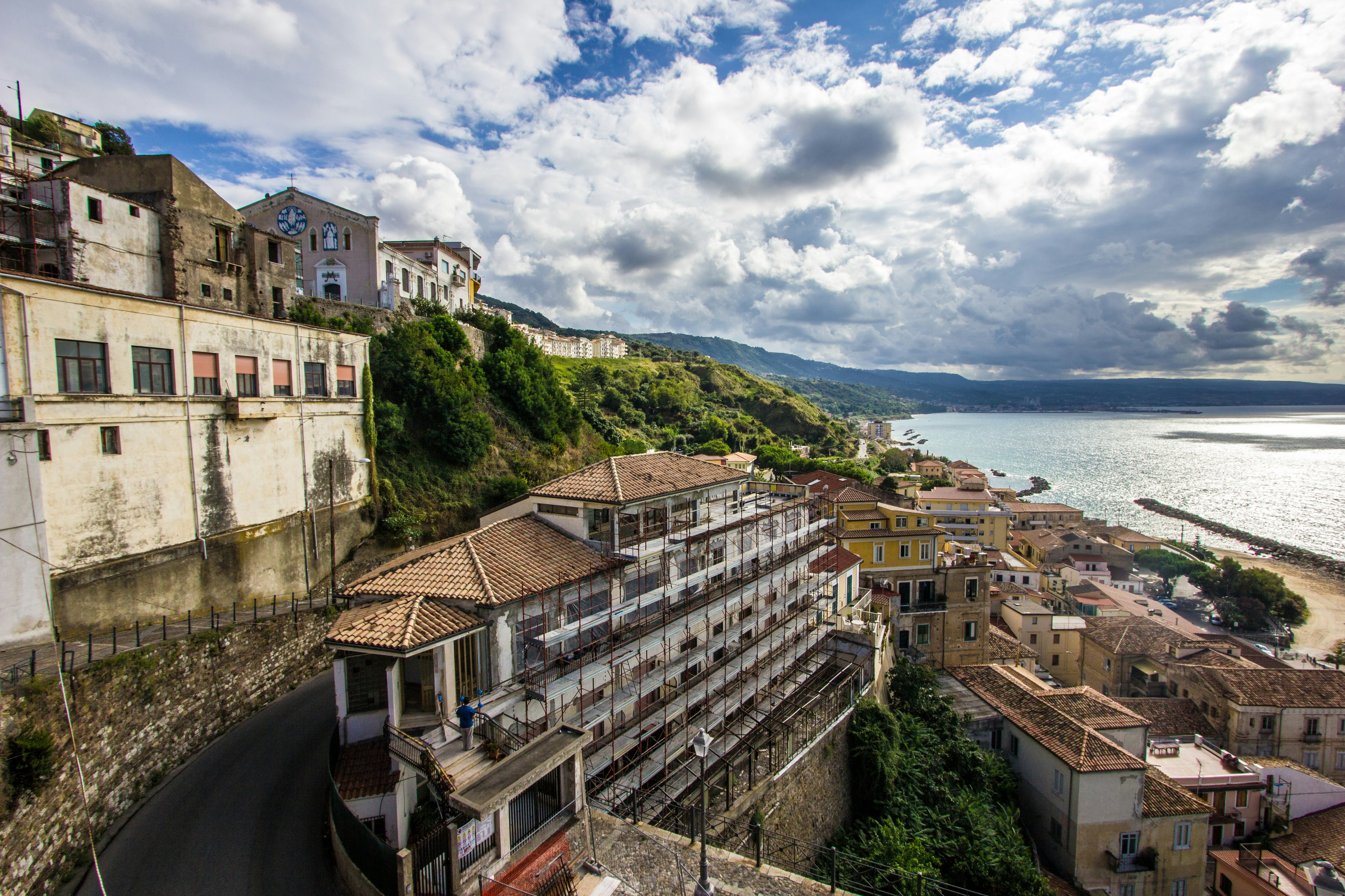Cliffside Sicilian Village Reaching Toward the Sea