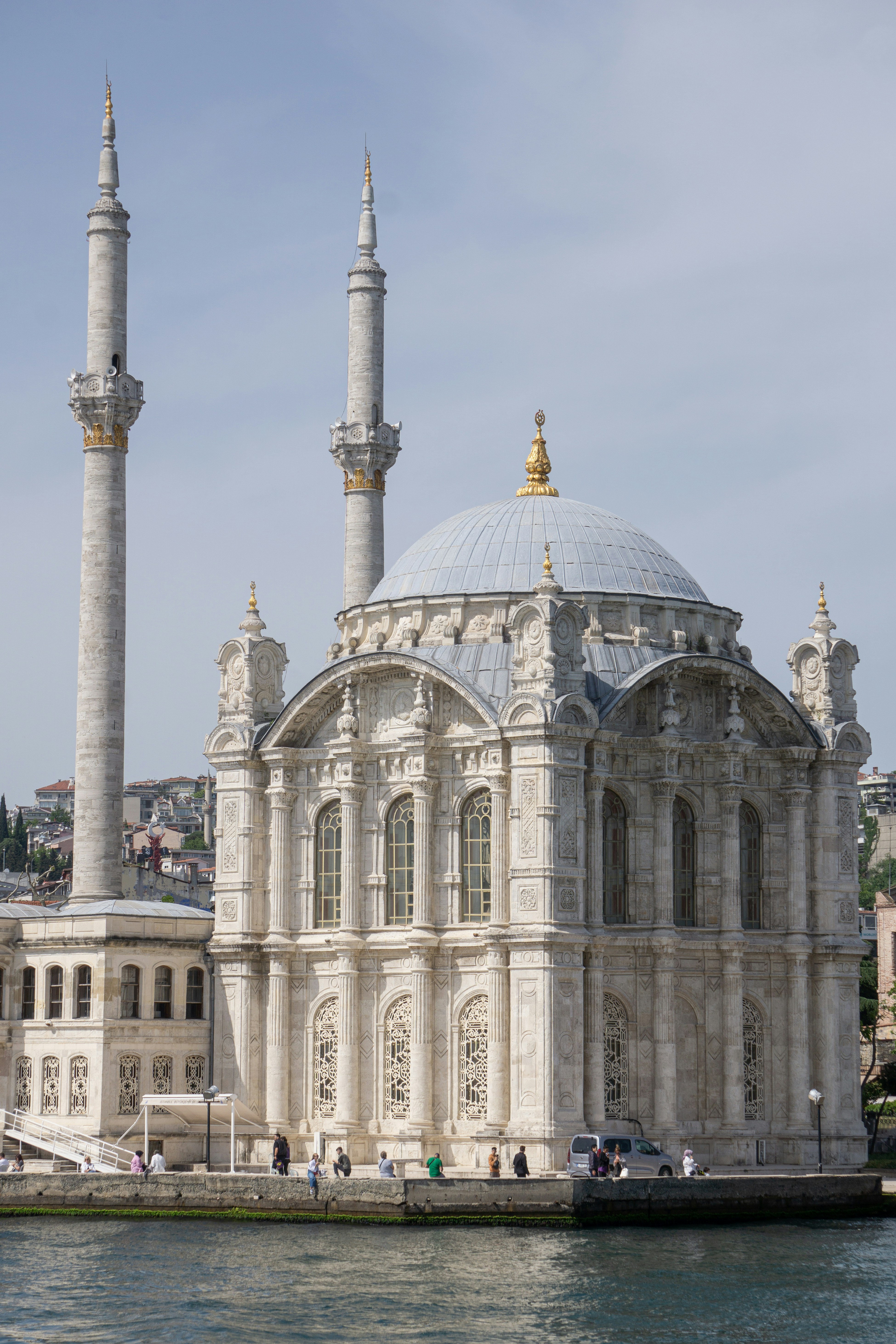 Ivory Dome by the Bosphorus: Marble Mosque Framed by Water and Minarets