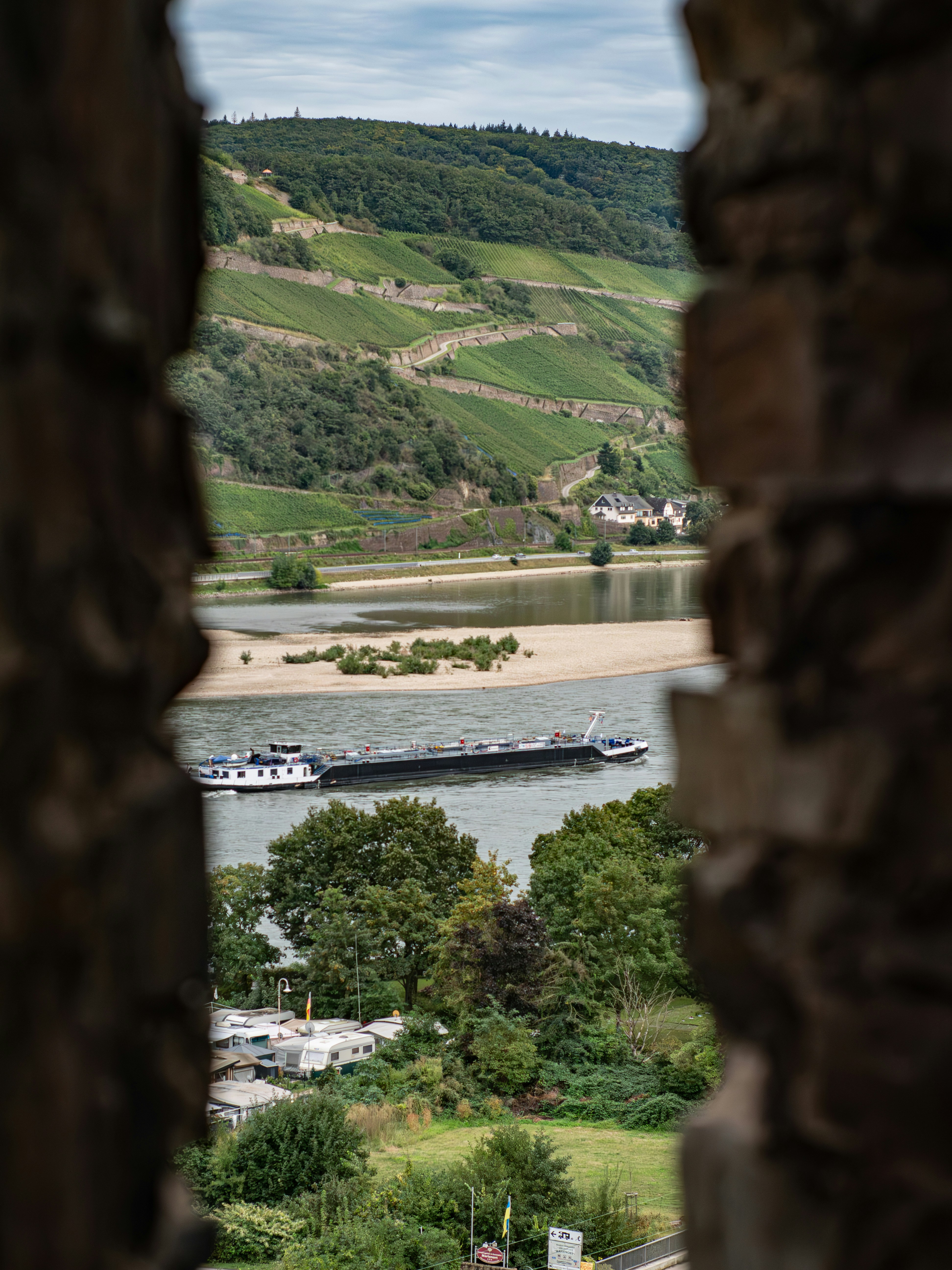 Vineyard Passage Framed by Ancient Walls