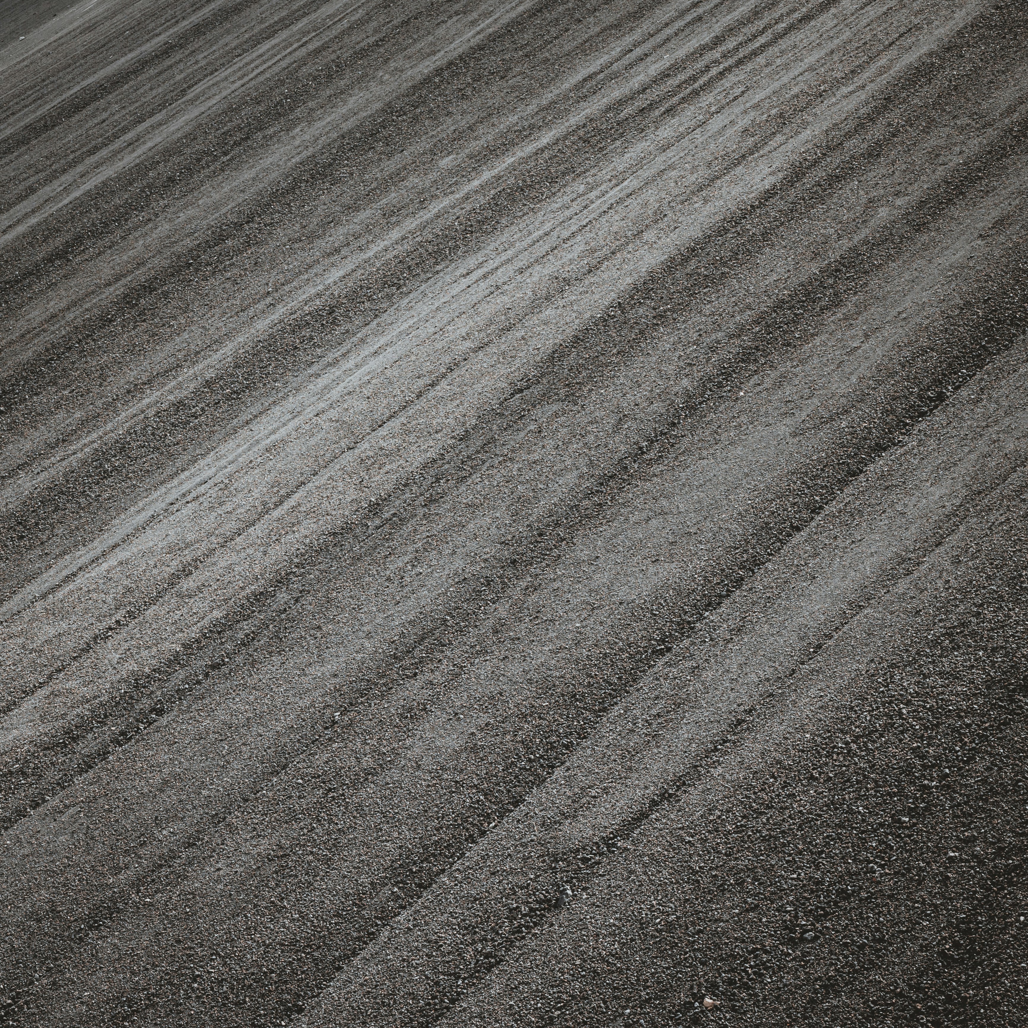Parallel Carvings in Gravel: a Study in Light and Texture