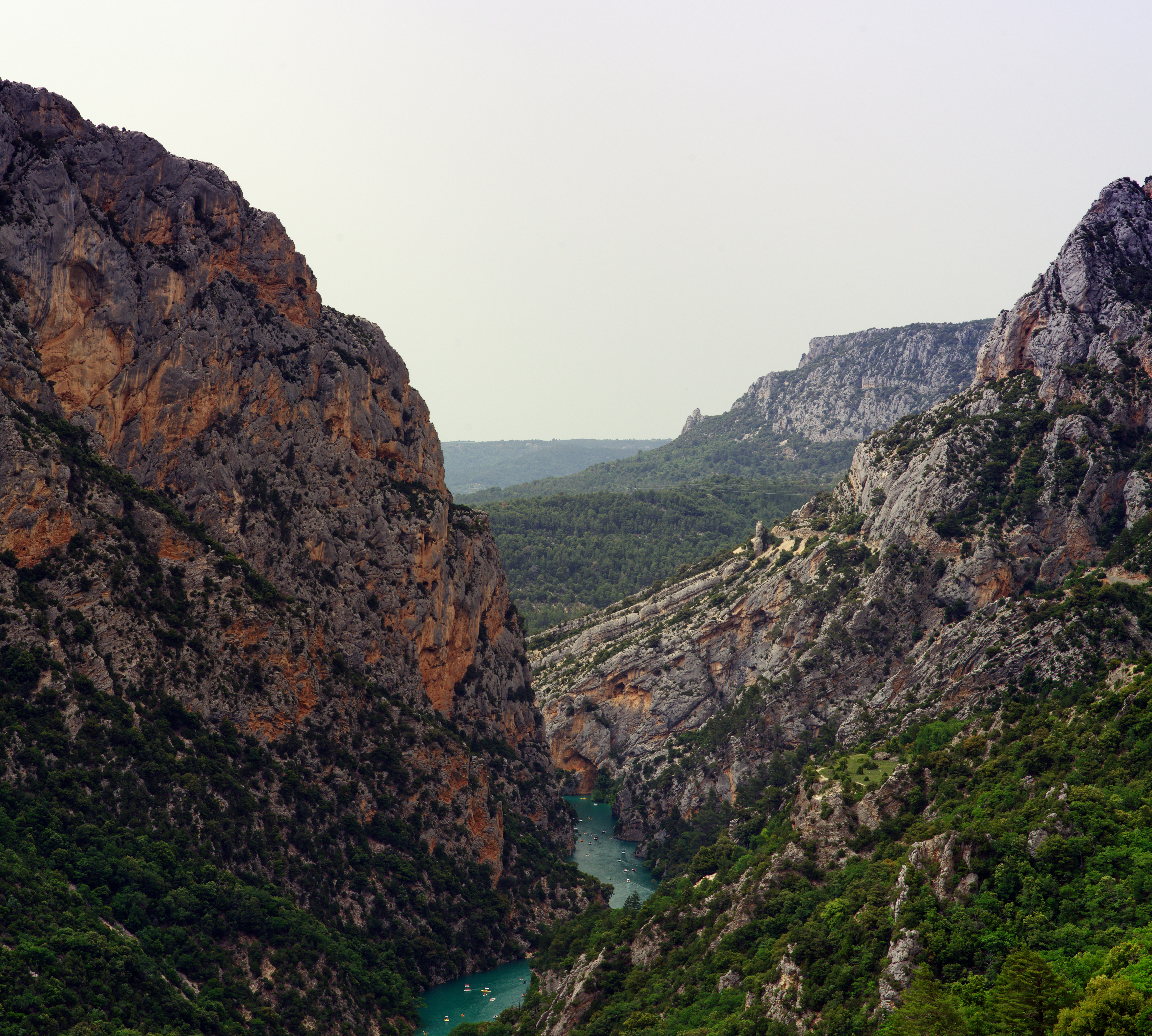 A view of a river running between two mountains