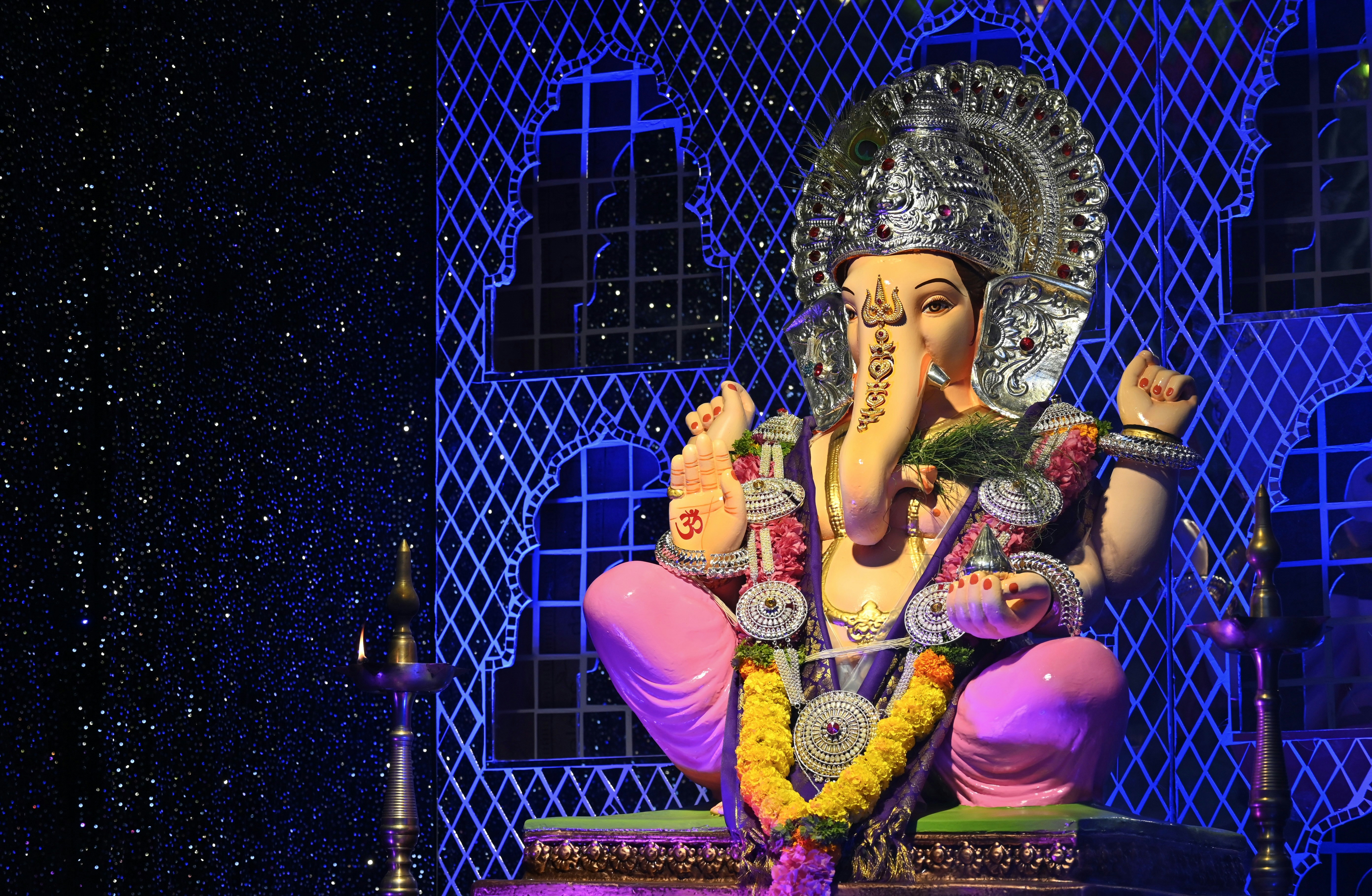 A statue of a god sitting on top of a chair photo – Free Blue aesthetic ...