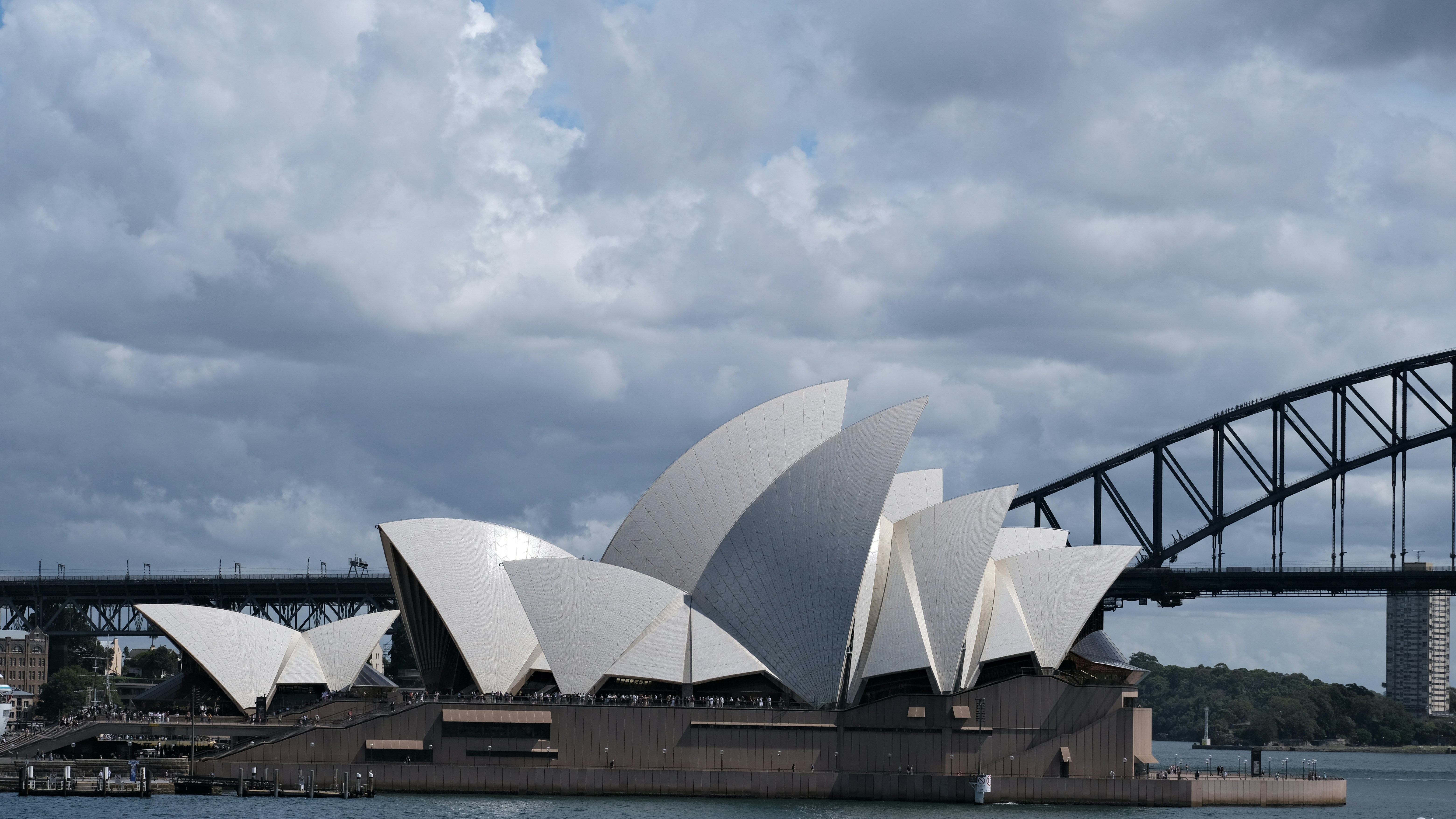 Sailscape Over Sydney Harbour: Opera House Under Overcast Skies