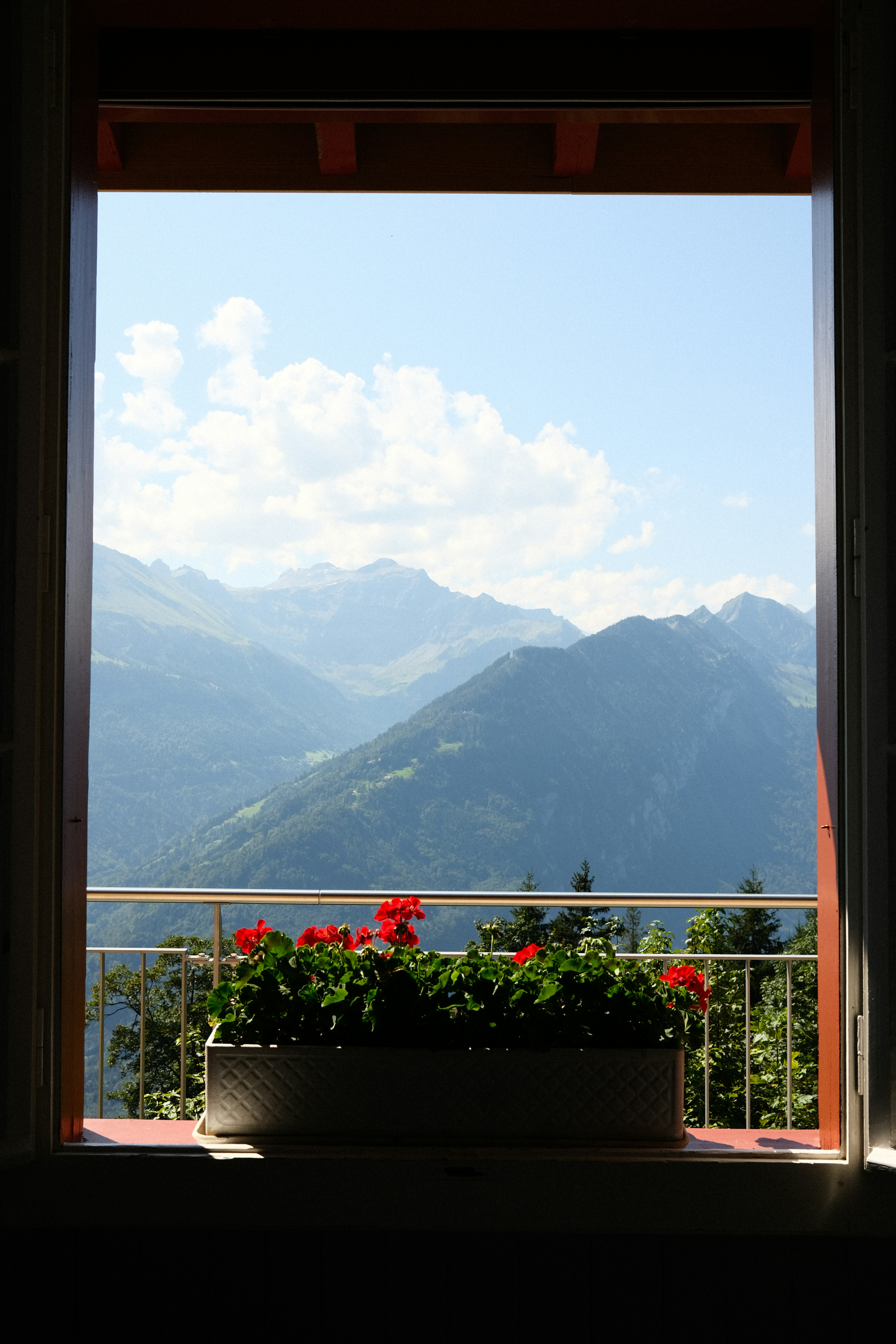 A window with a view of a mountain range photo – Free Interlaken Image ...