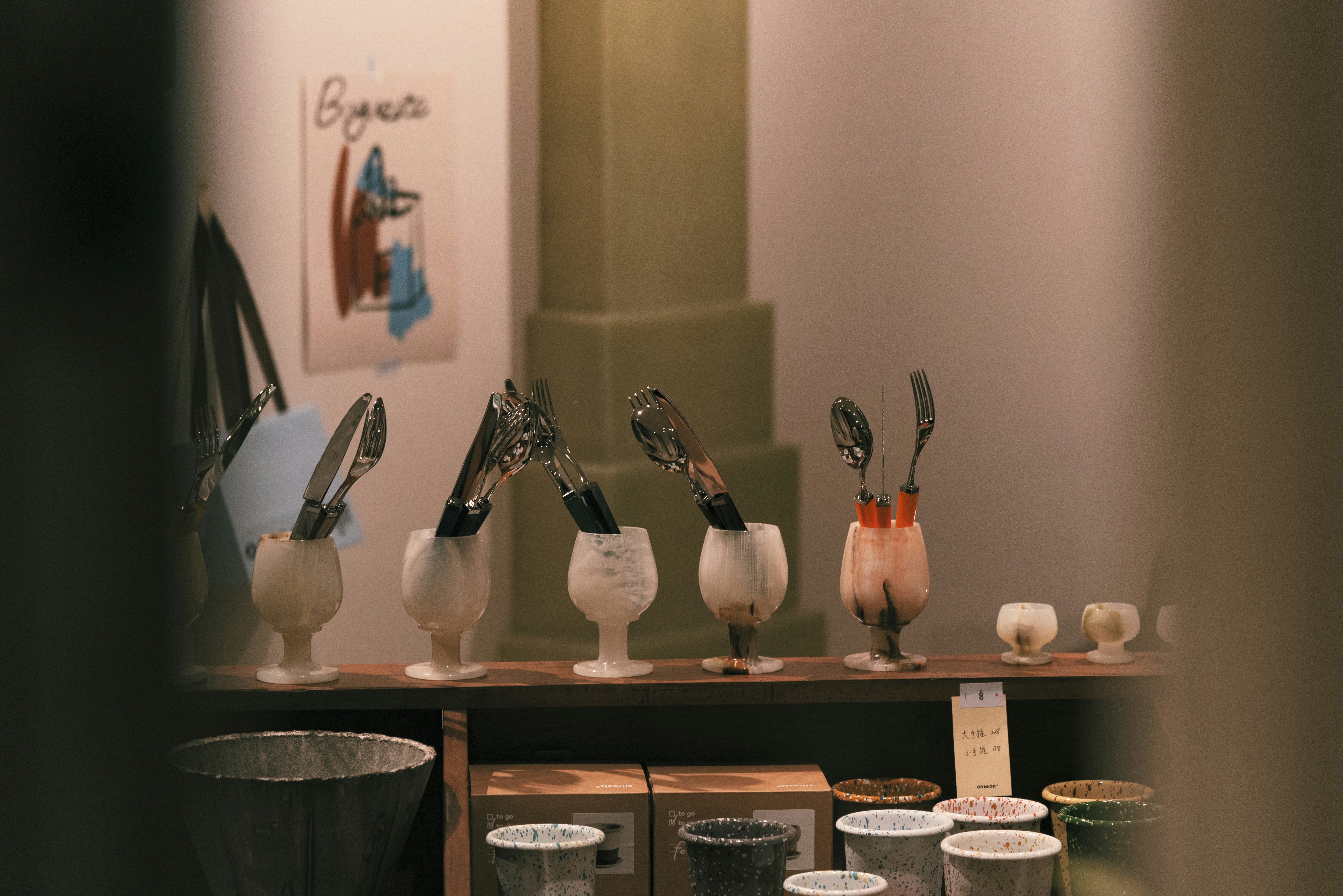 A table with a bunch of cups and spoons on it photo – Free Shanghai ...