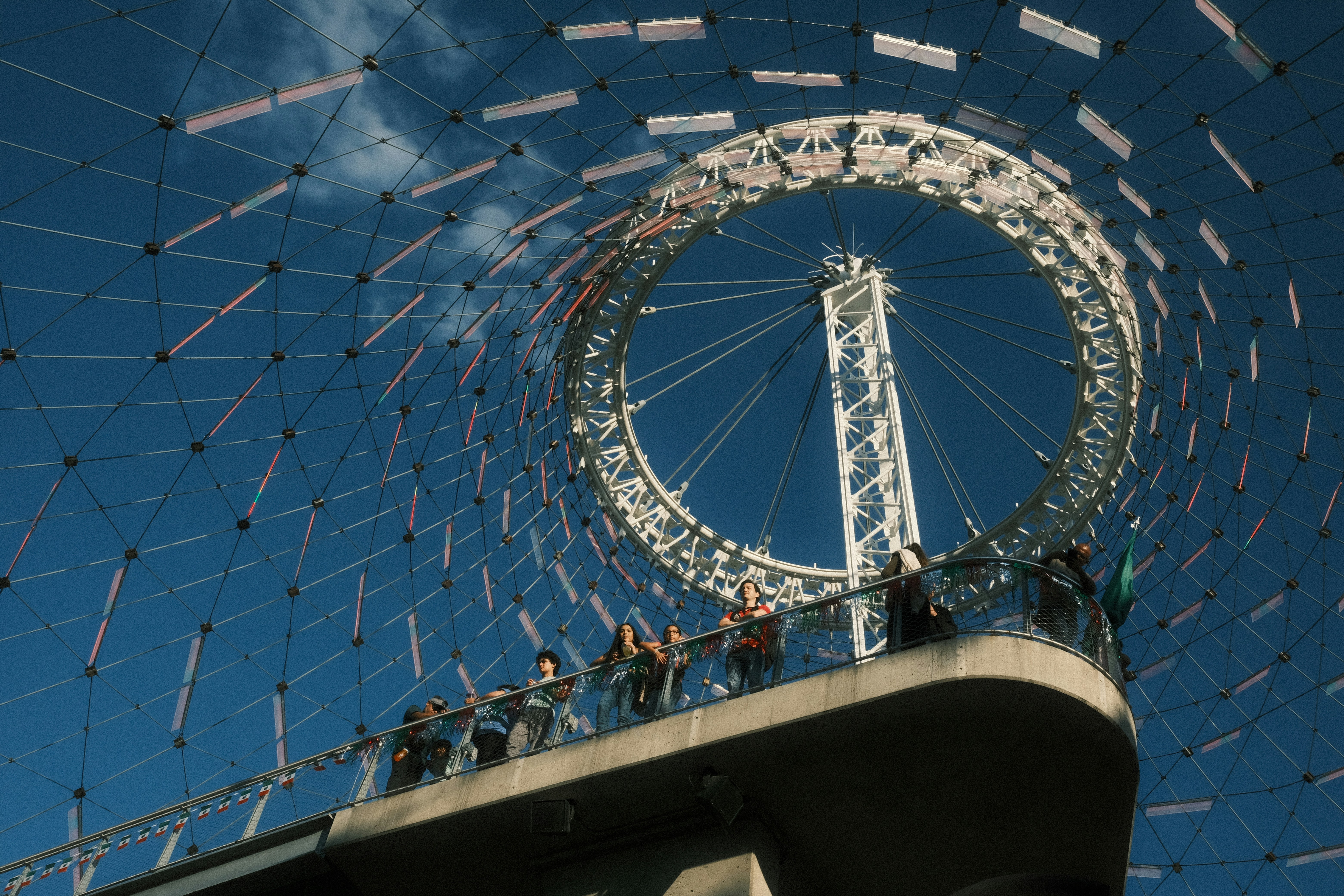 Ringed Skyway: Ferris Wheel Seen Through a Crystal Lattice Dome