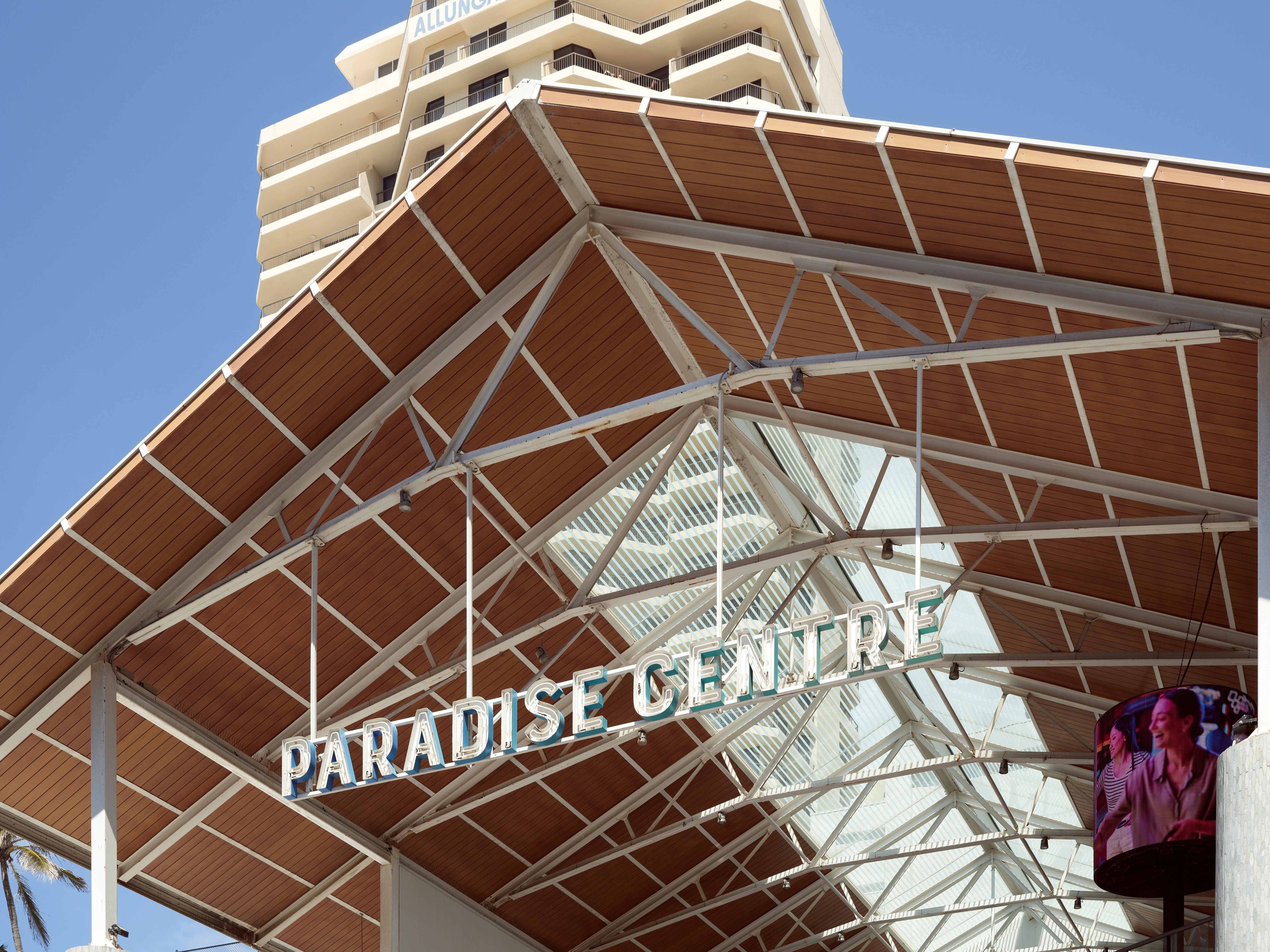 Paradise Centre: Architectural Facade Under a Clear Blue Sky