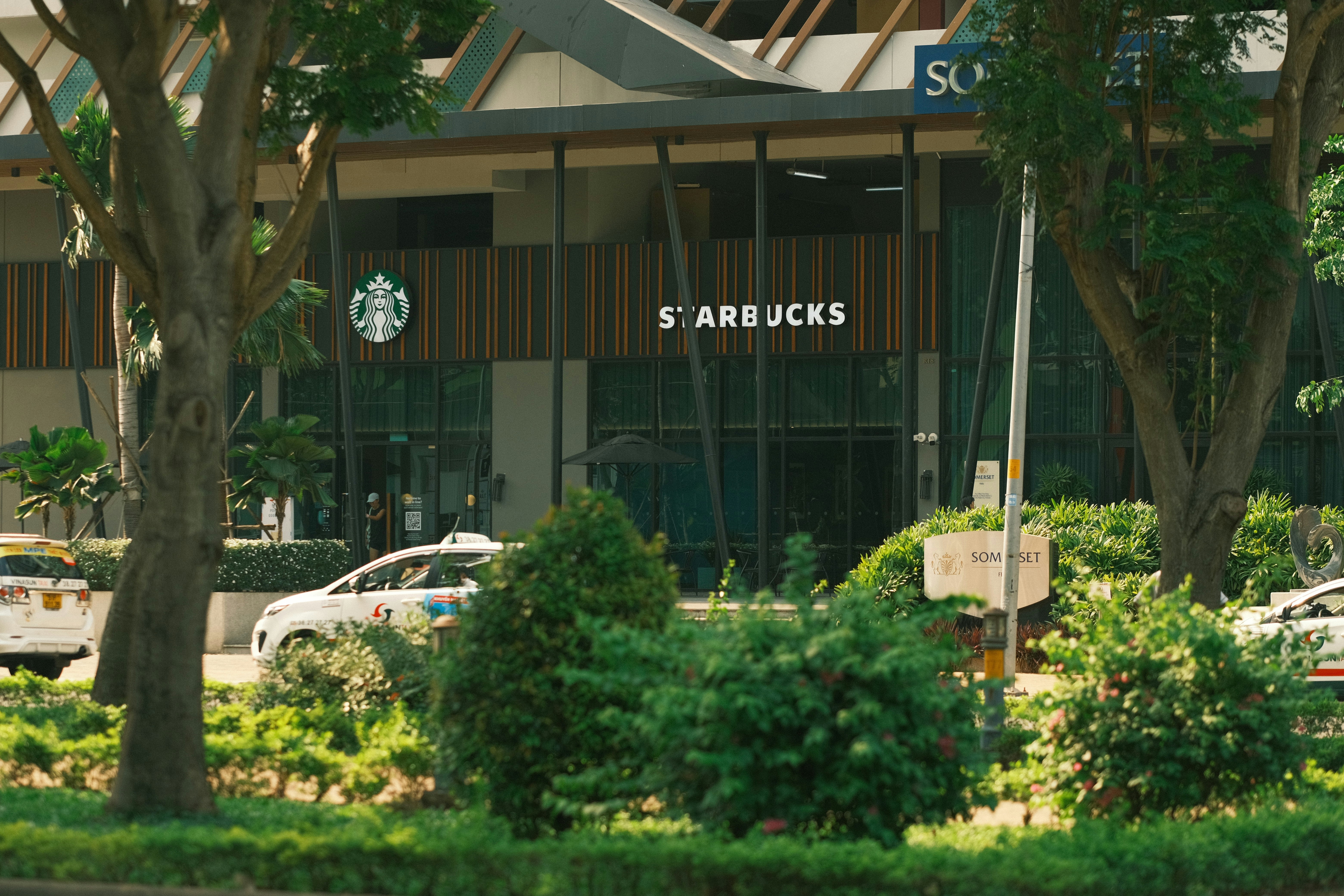 Urban Starbucks Through a Glass Curtain
