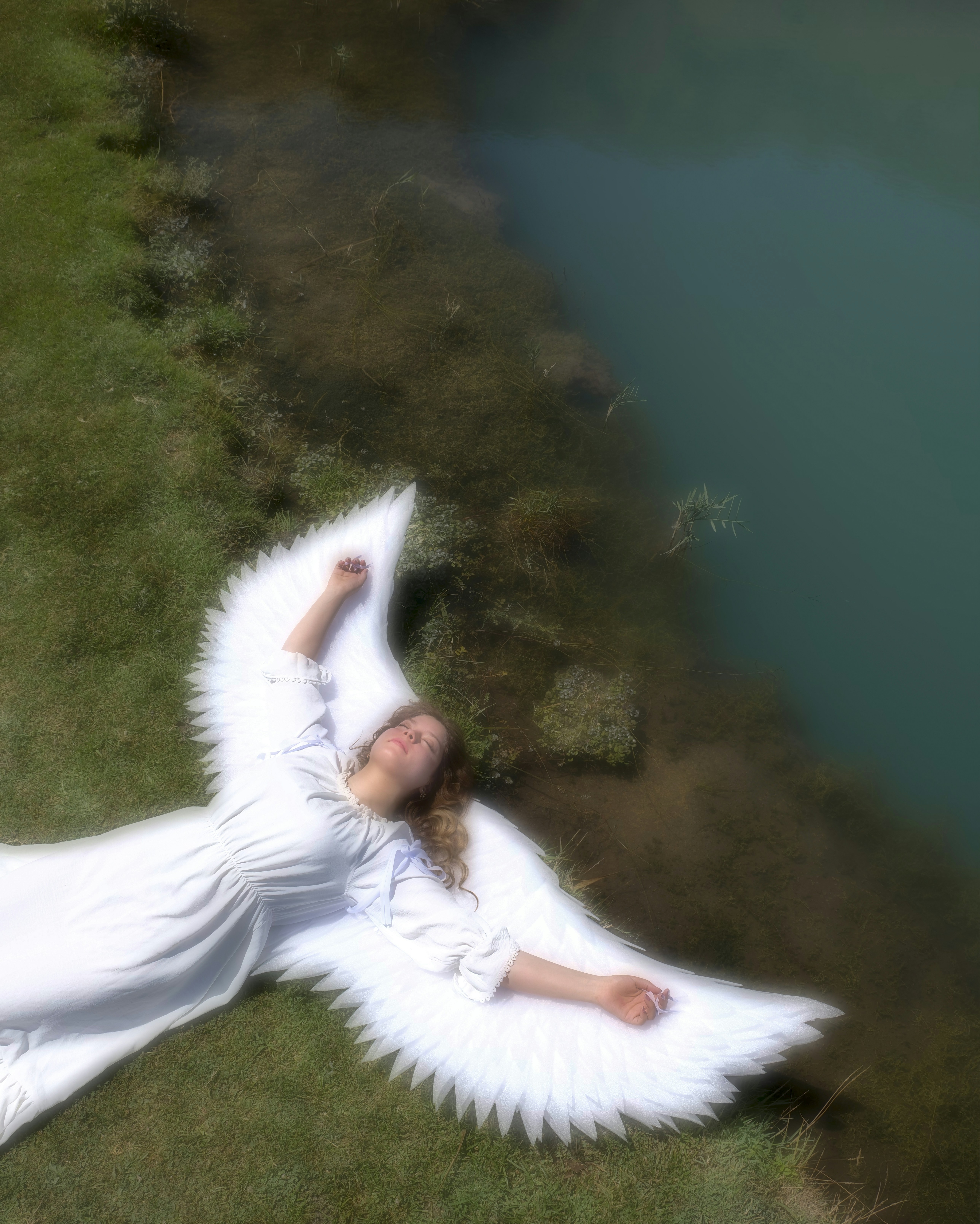 An aerial view of a woman dressed as an angel photo – Free Experimental ...