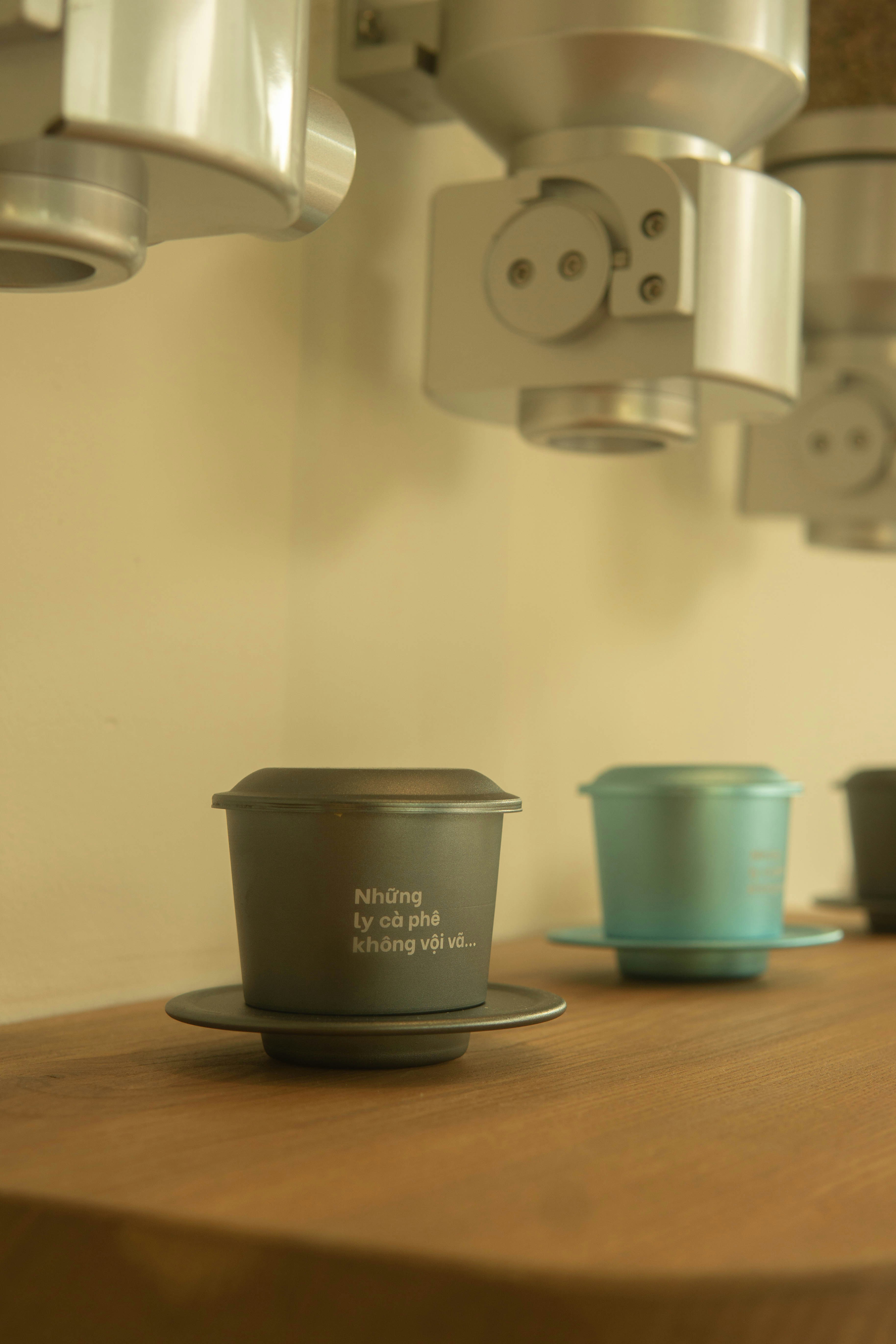 Quiet Coffee Capsule on a Stainless Stage