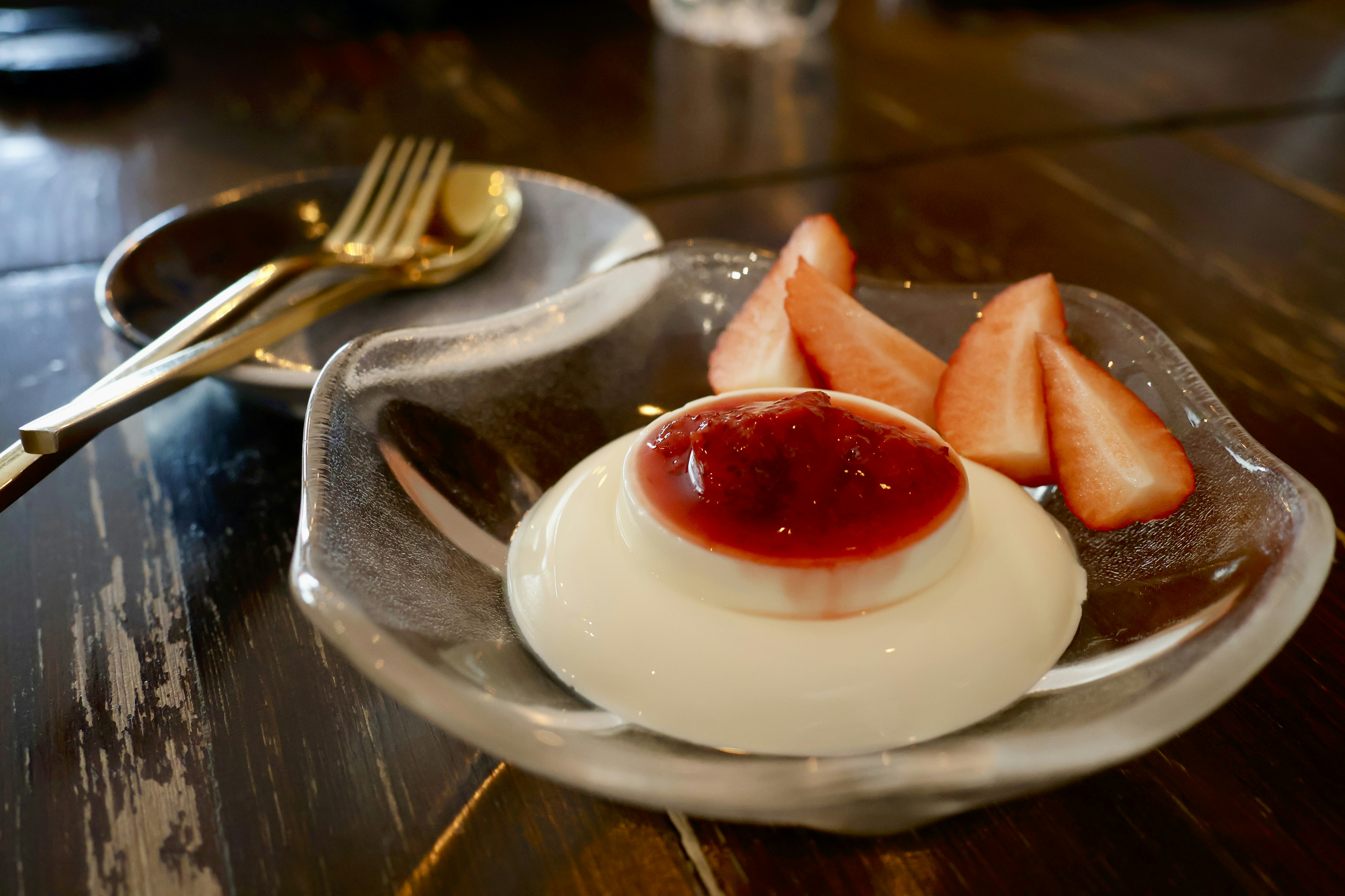 Strawberry Crown Panna Cotta on a Weathered Plate