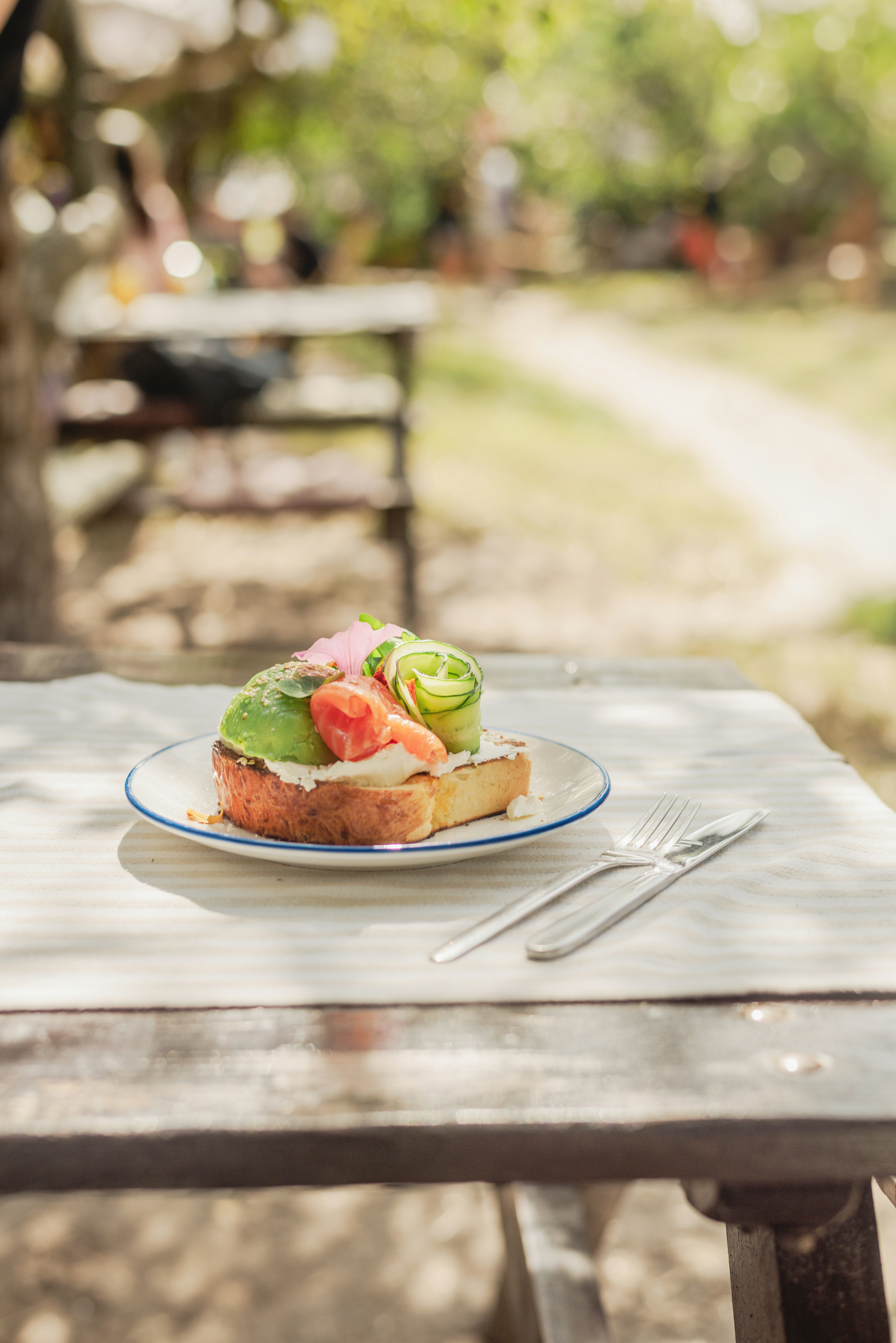 A plate of food sitting on top of a wooden table