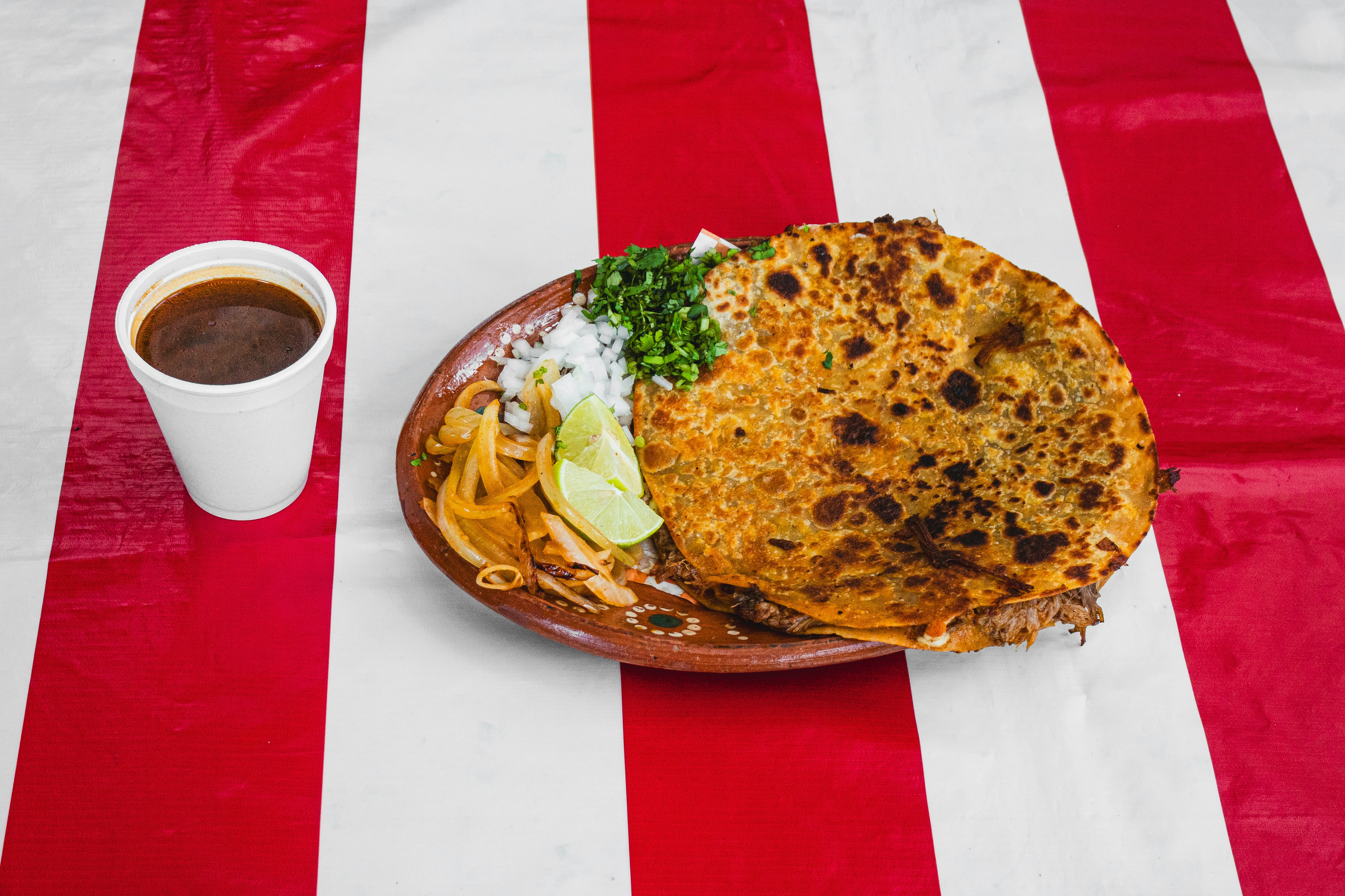 Charred Roti Crown on a Bold Striped Table