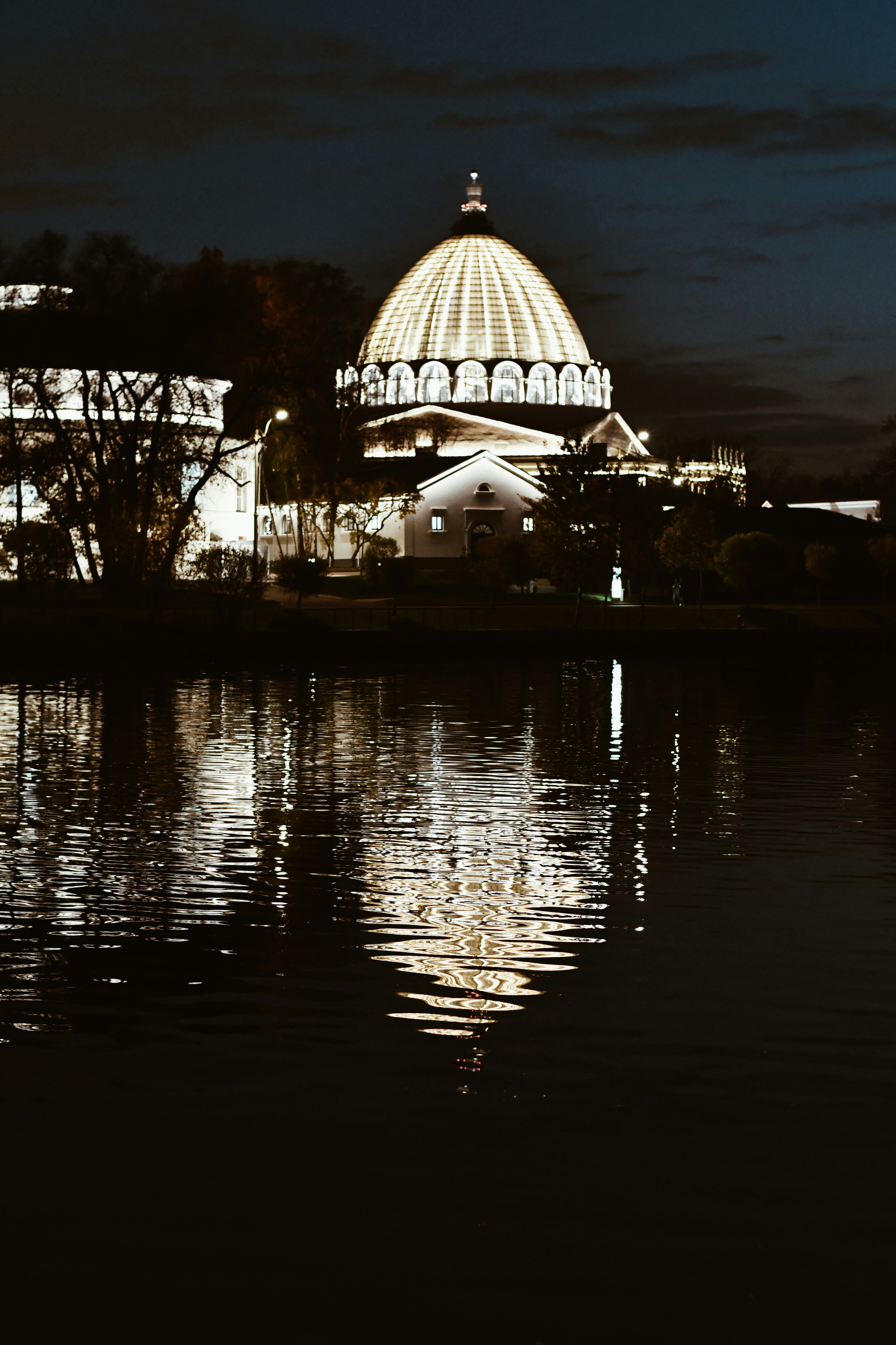 Moonlit Rotunda by the River: Nighttime Reflections