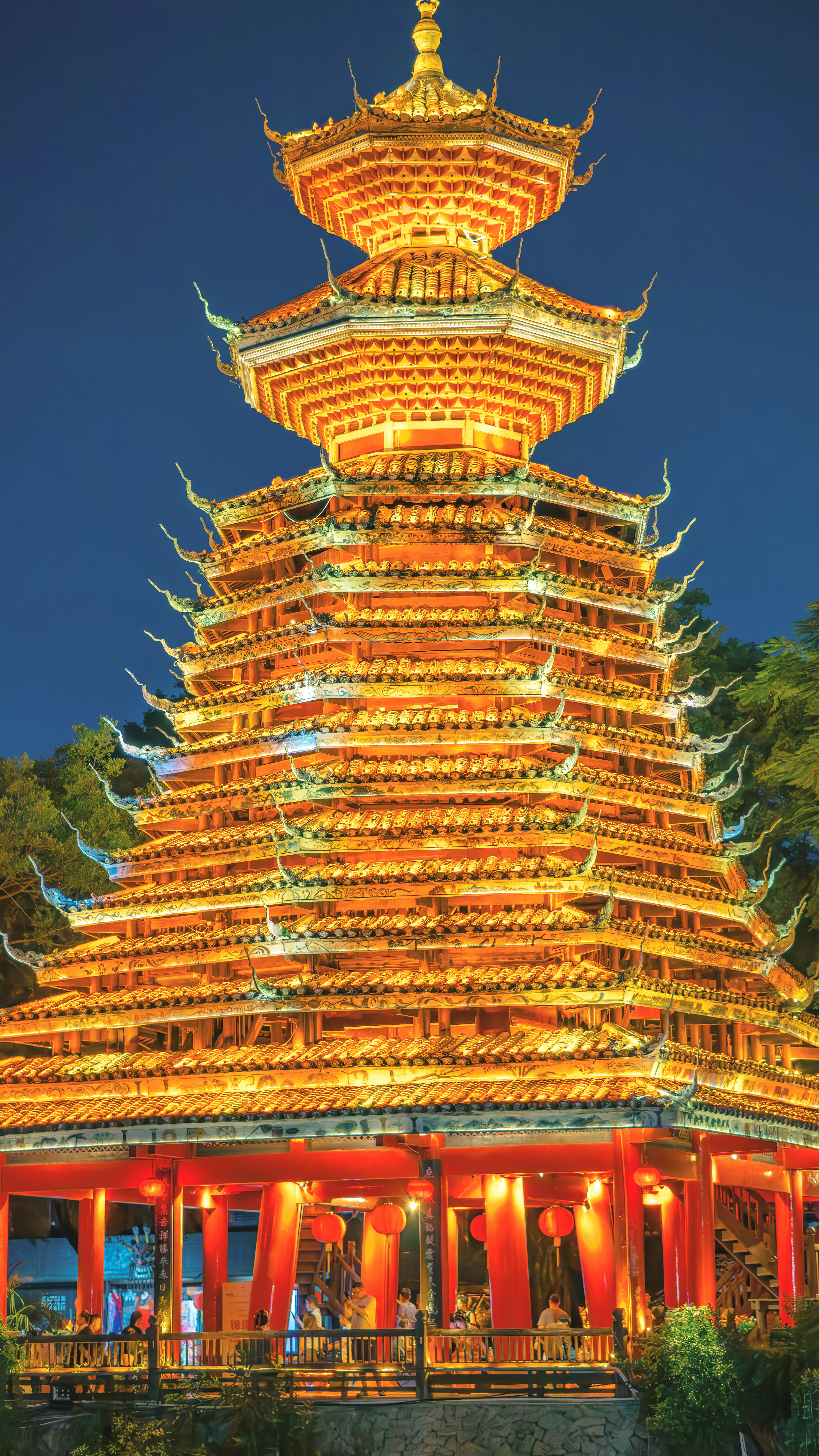 Nightglow Pagoda: Golden Tiers Against a Deep Blue Night
