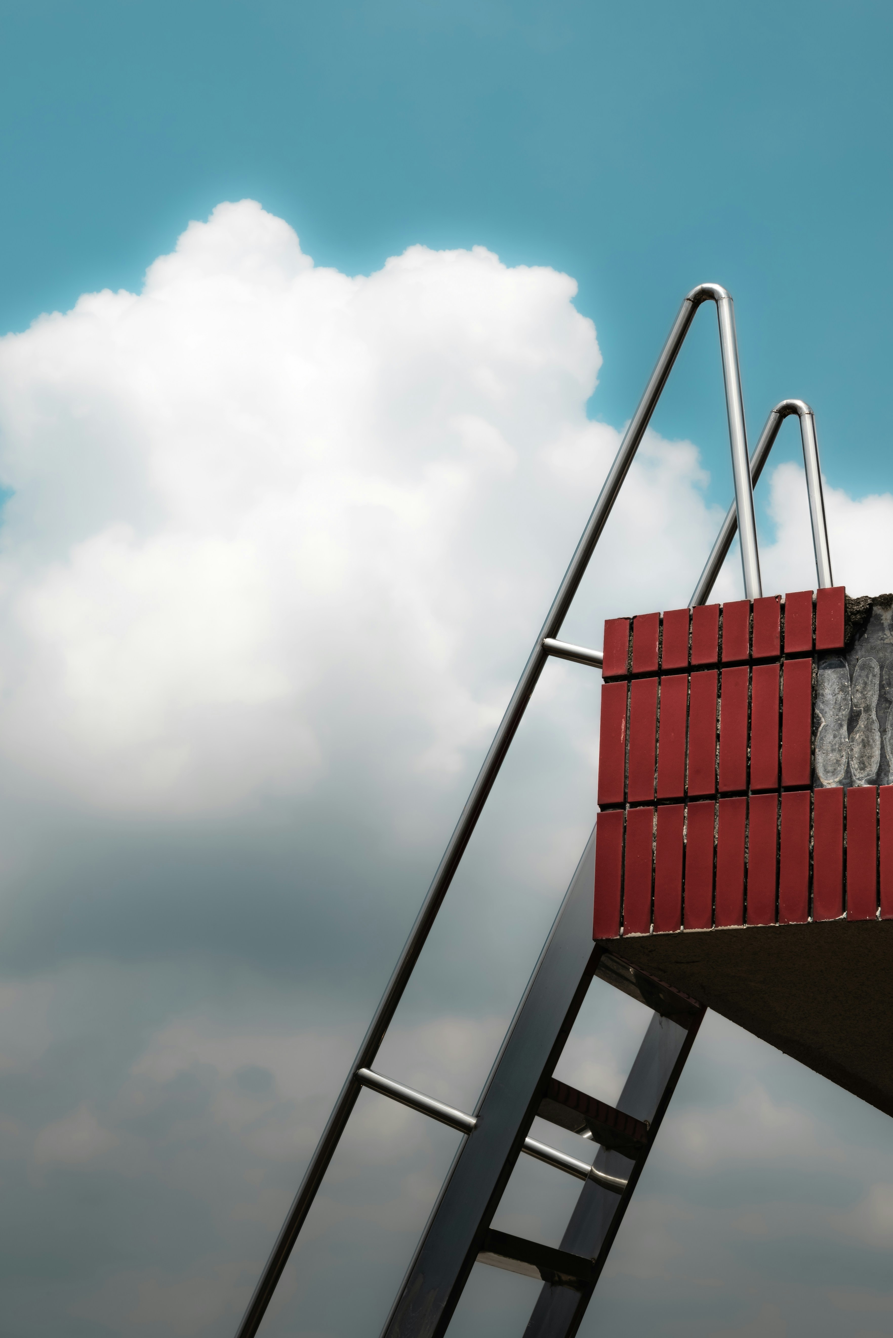 A red ladder going up to a sky with clouds photo – Free Clouds Image on ...