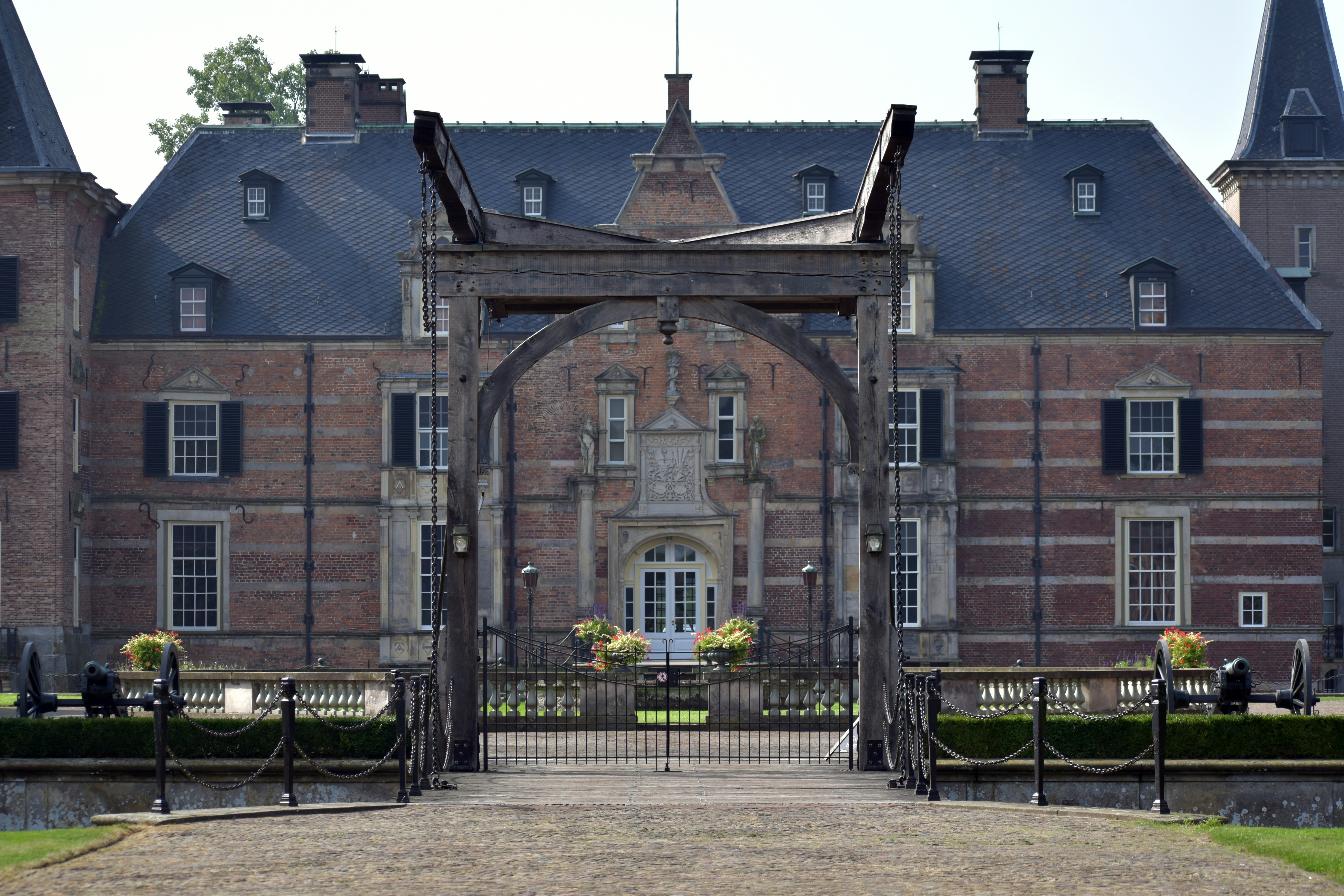 An imposing castle with a drawbridge (Middle Ages - history - culture)