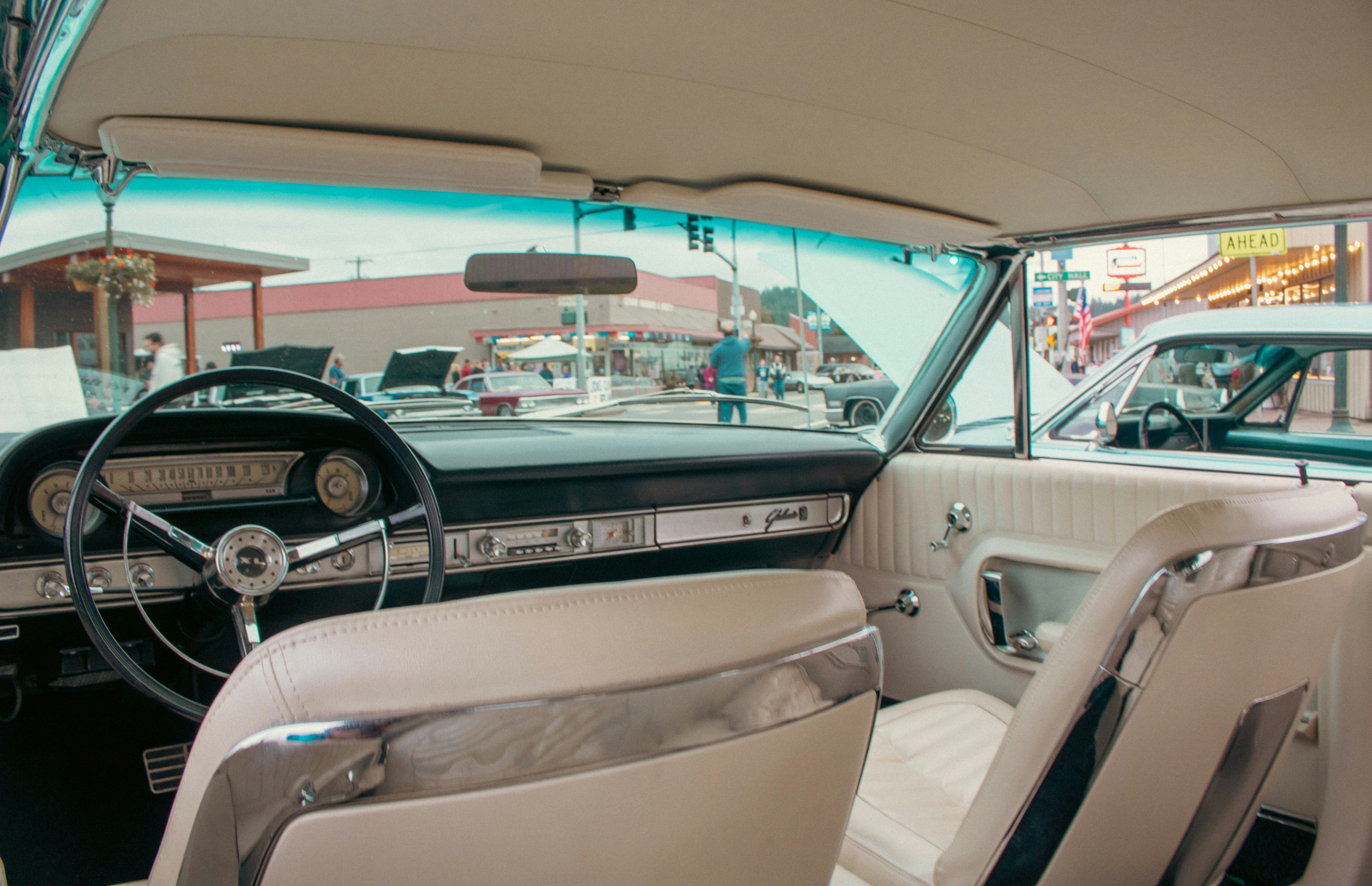Harbor of chrome and era: vintage car interior in bright daylight