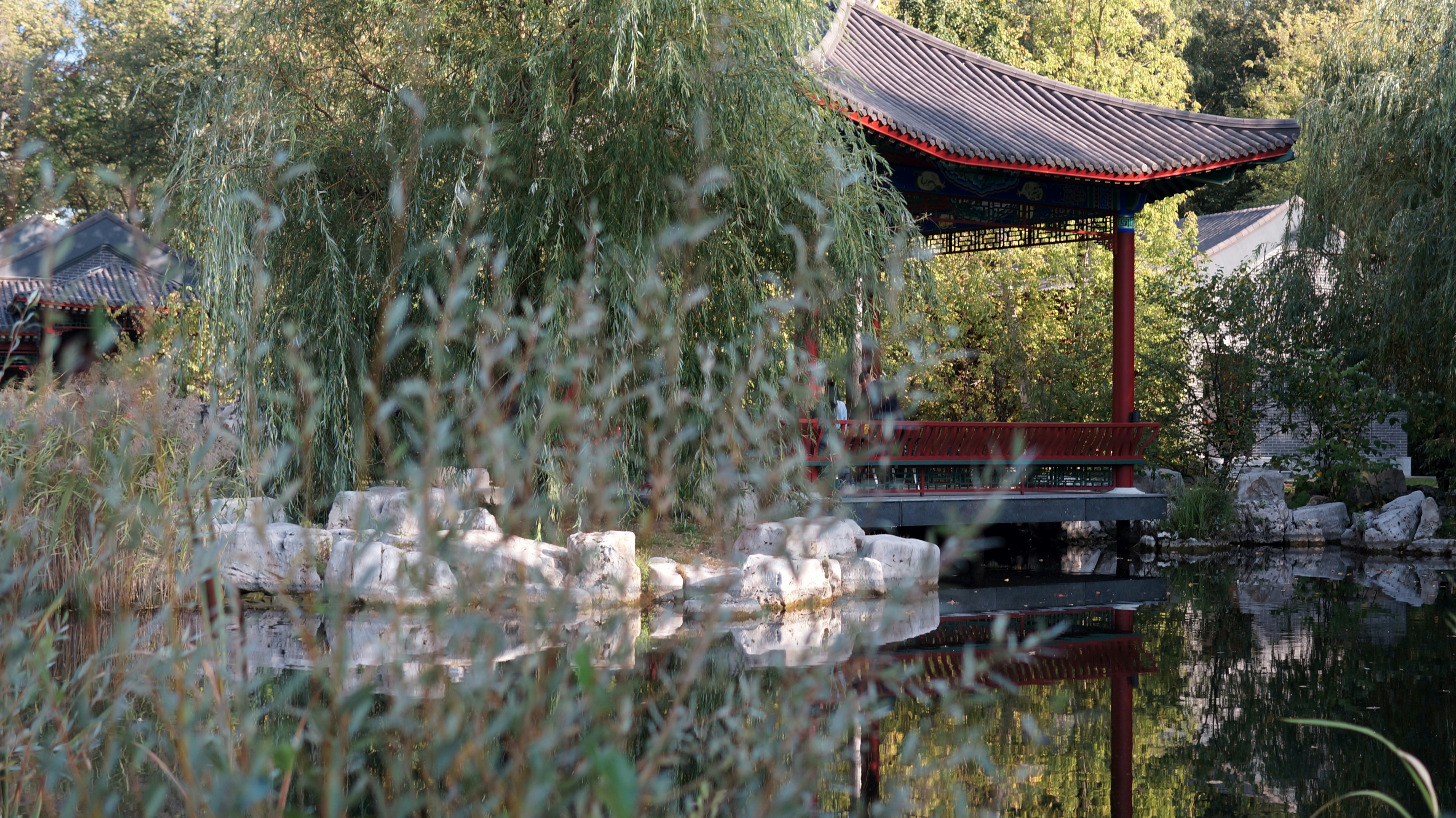 Red Pavilion in a Mirror-Pond Garden