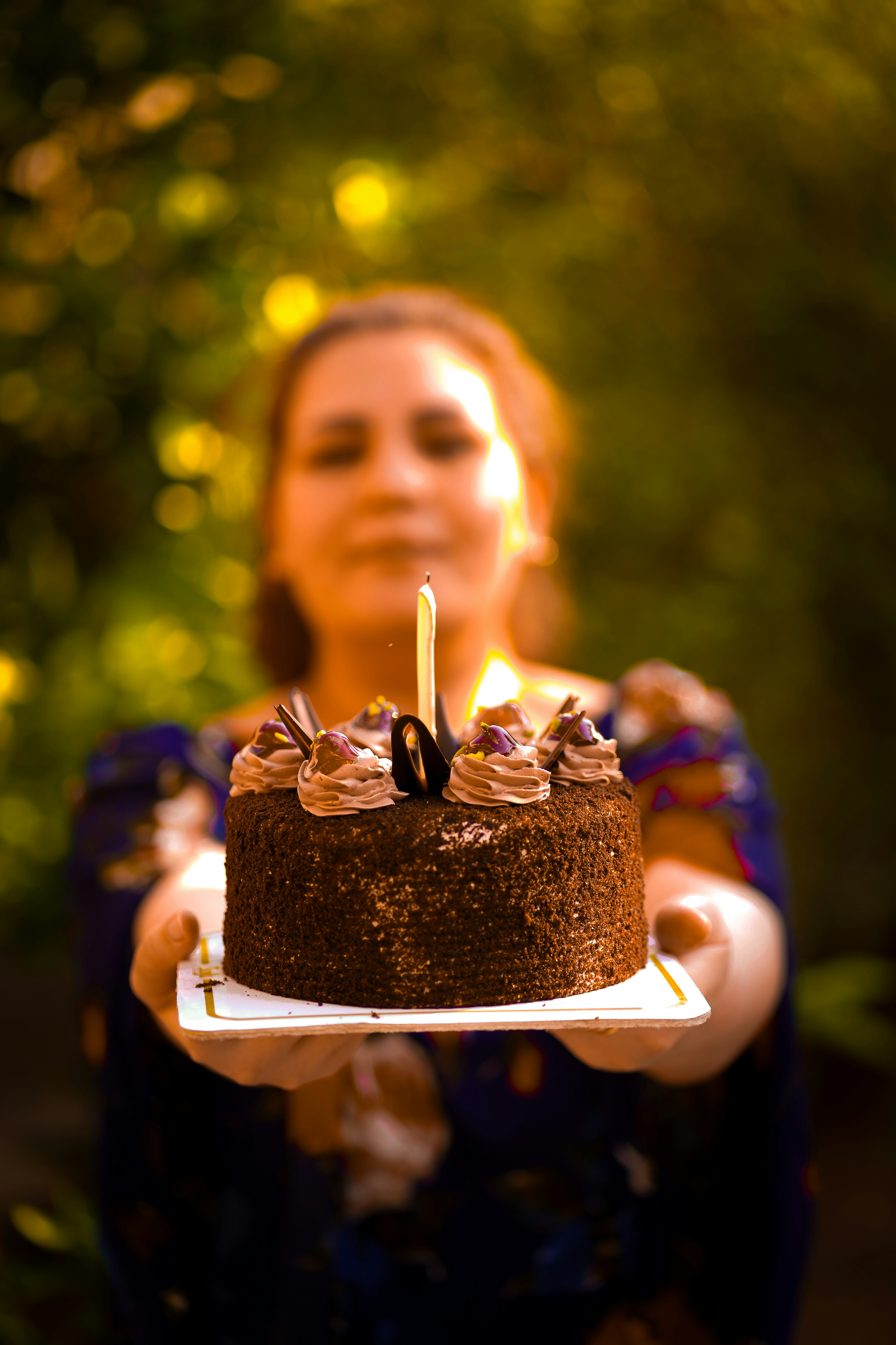 Birthday Moment: The Cake Reaches Toward the Light