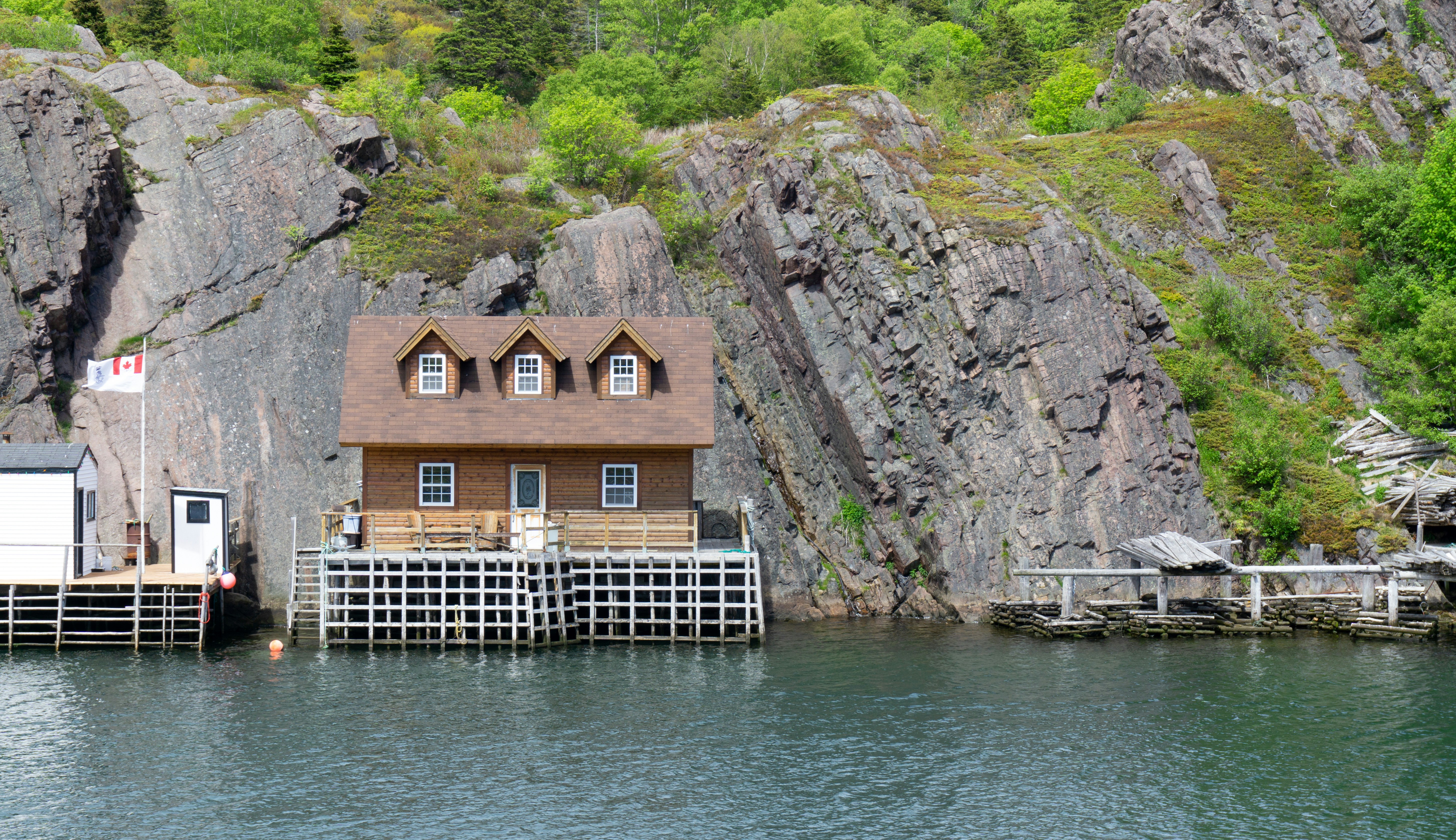 Seaside Retreat Nestled Against Rocky Cliffs