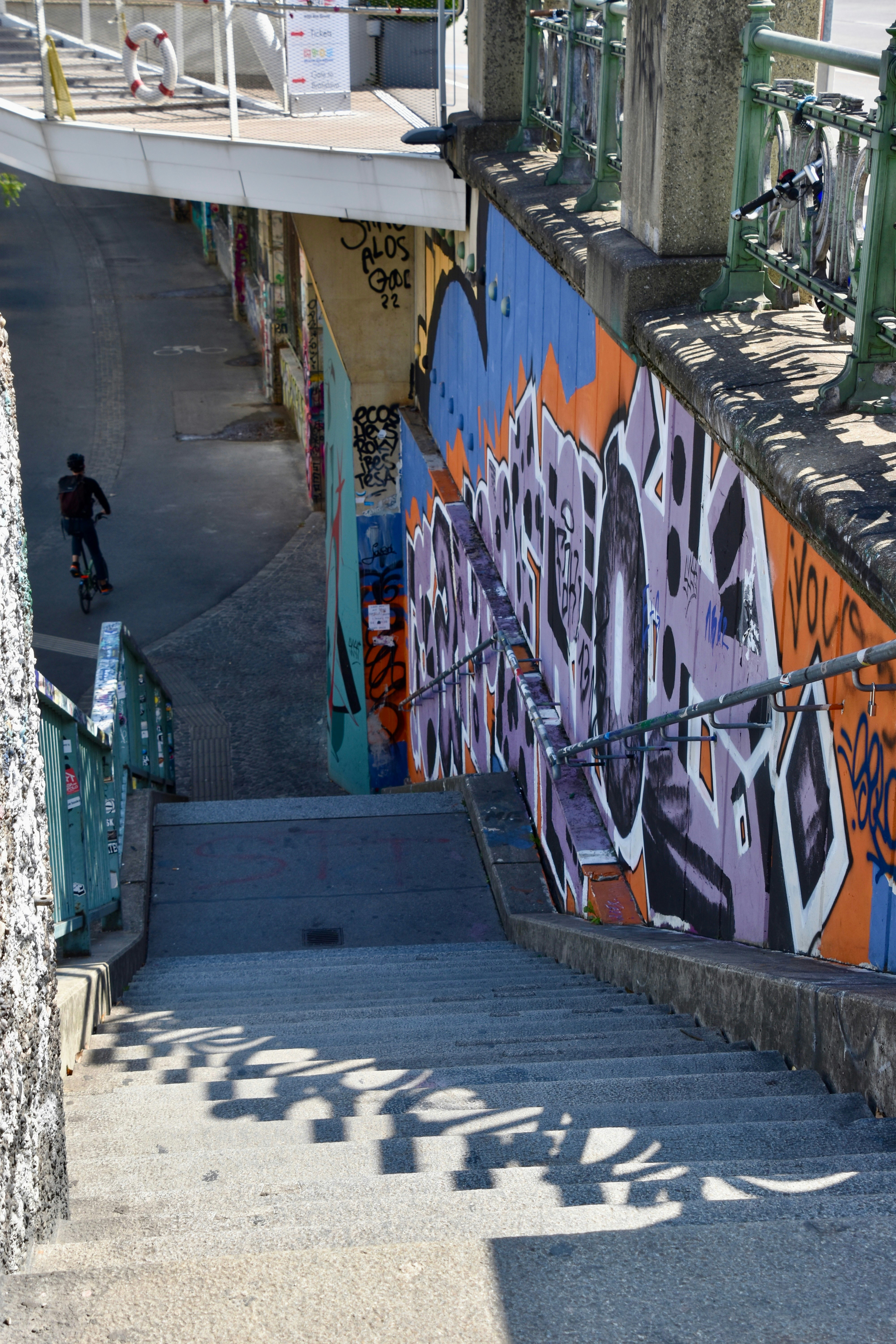 Graffiti Staircase: Colorful Wall Leads Your Descent