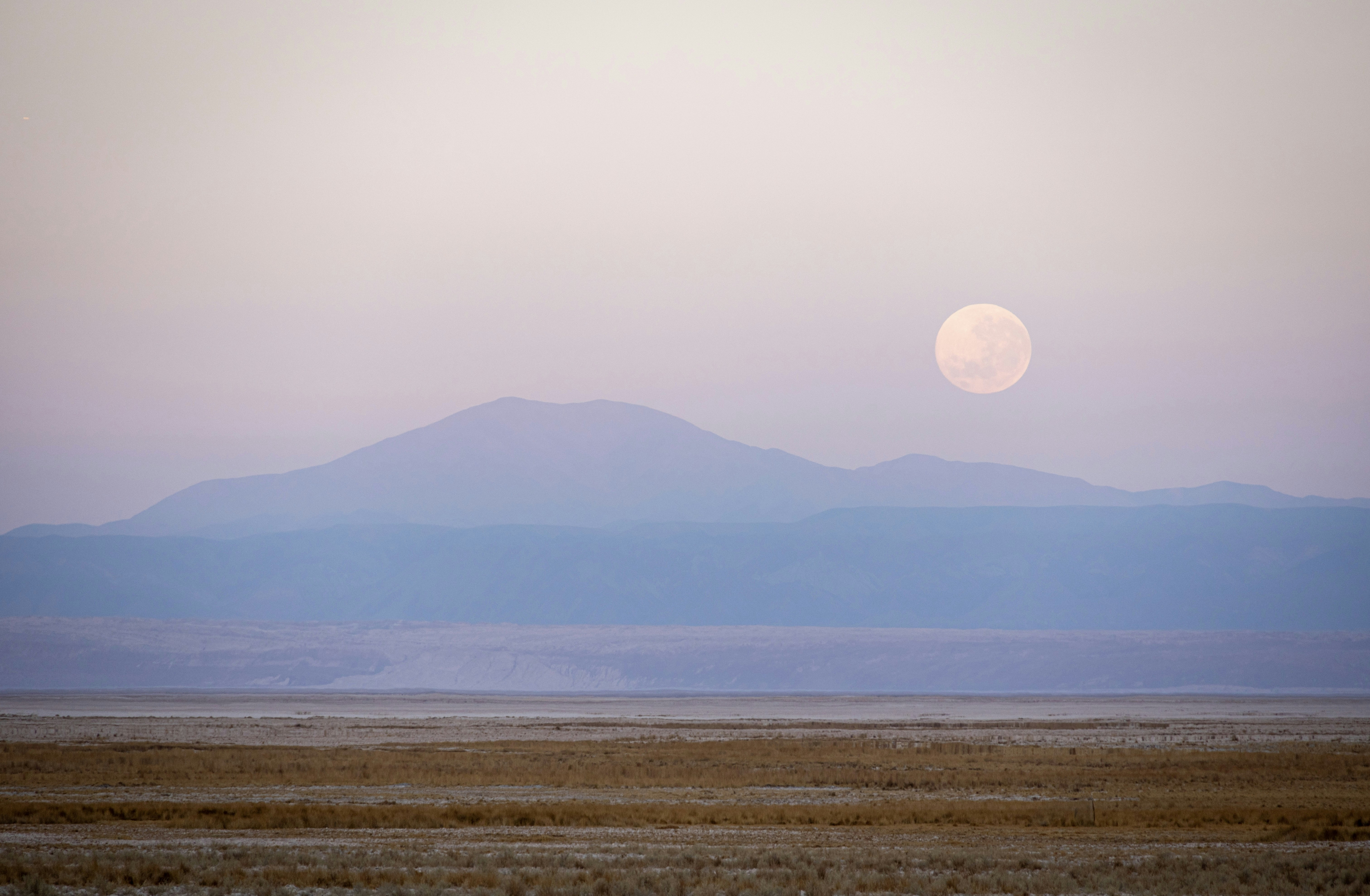Moonrise Over Distant Dunes and Silent Range