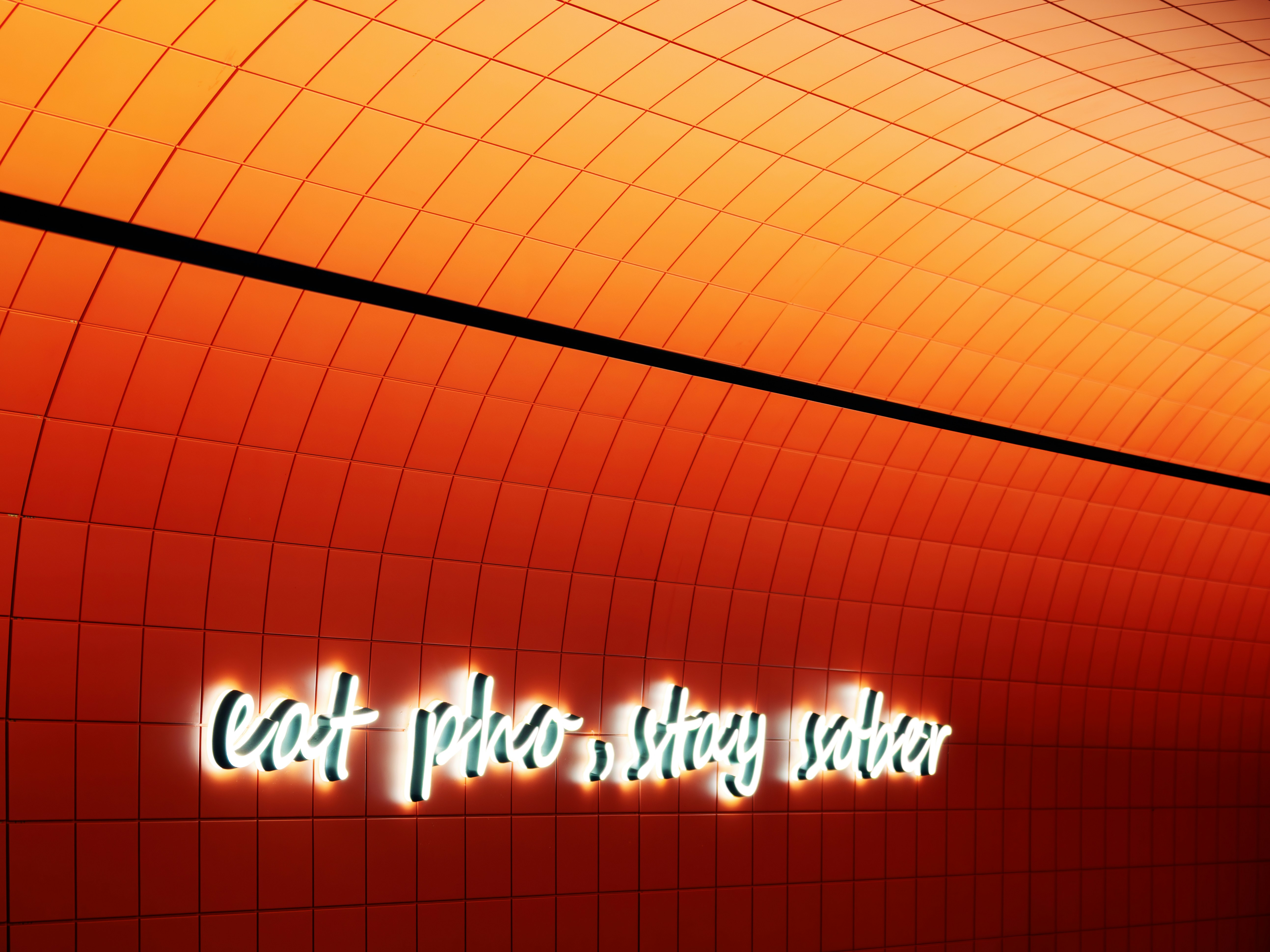 Neon Script over a Sunlit Hull