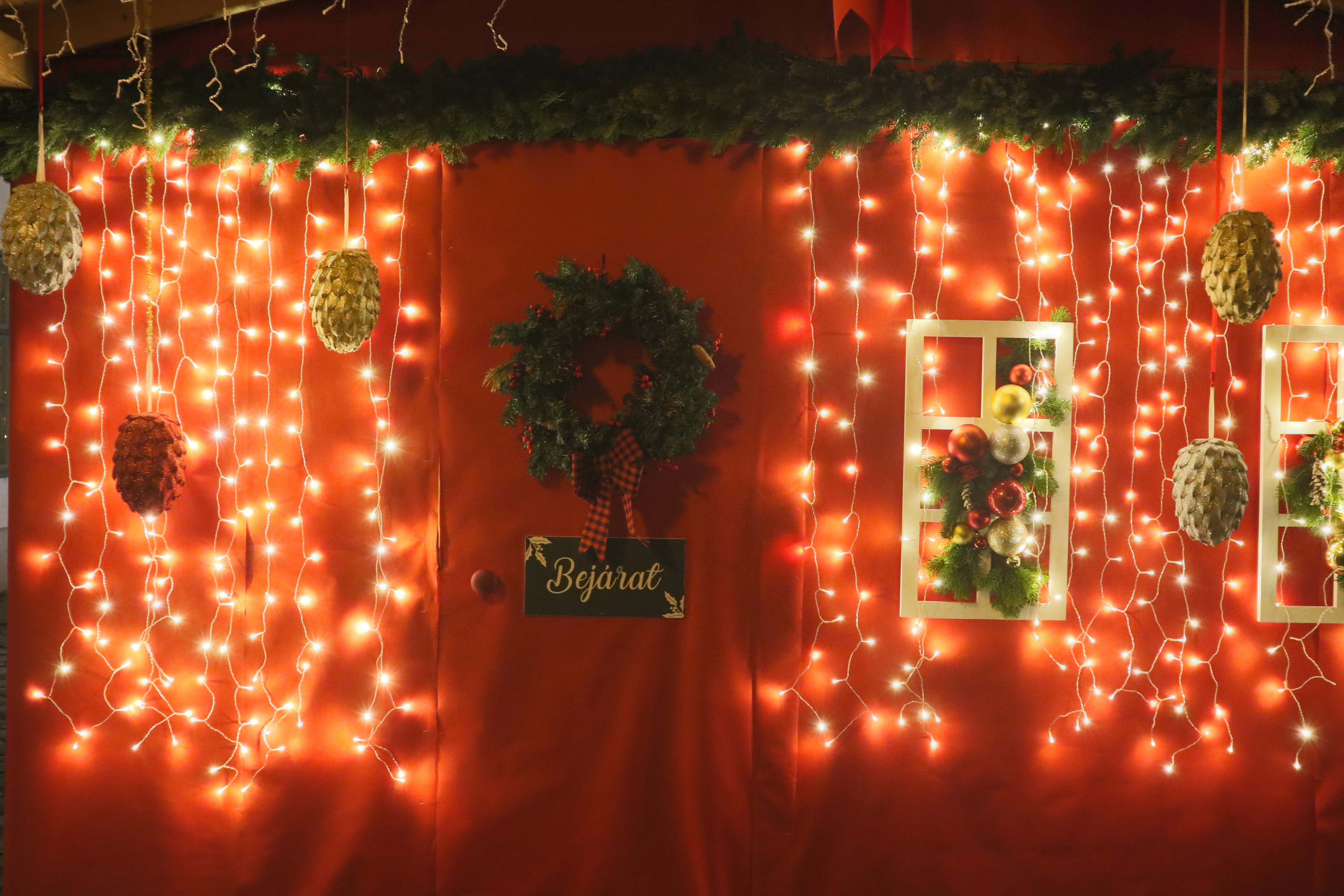 A room decorated with christmas lights and decorations