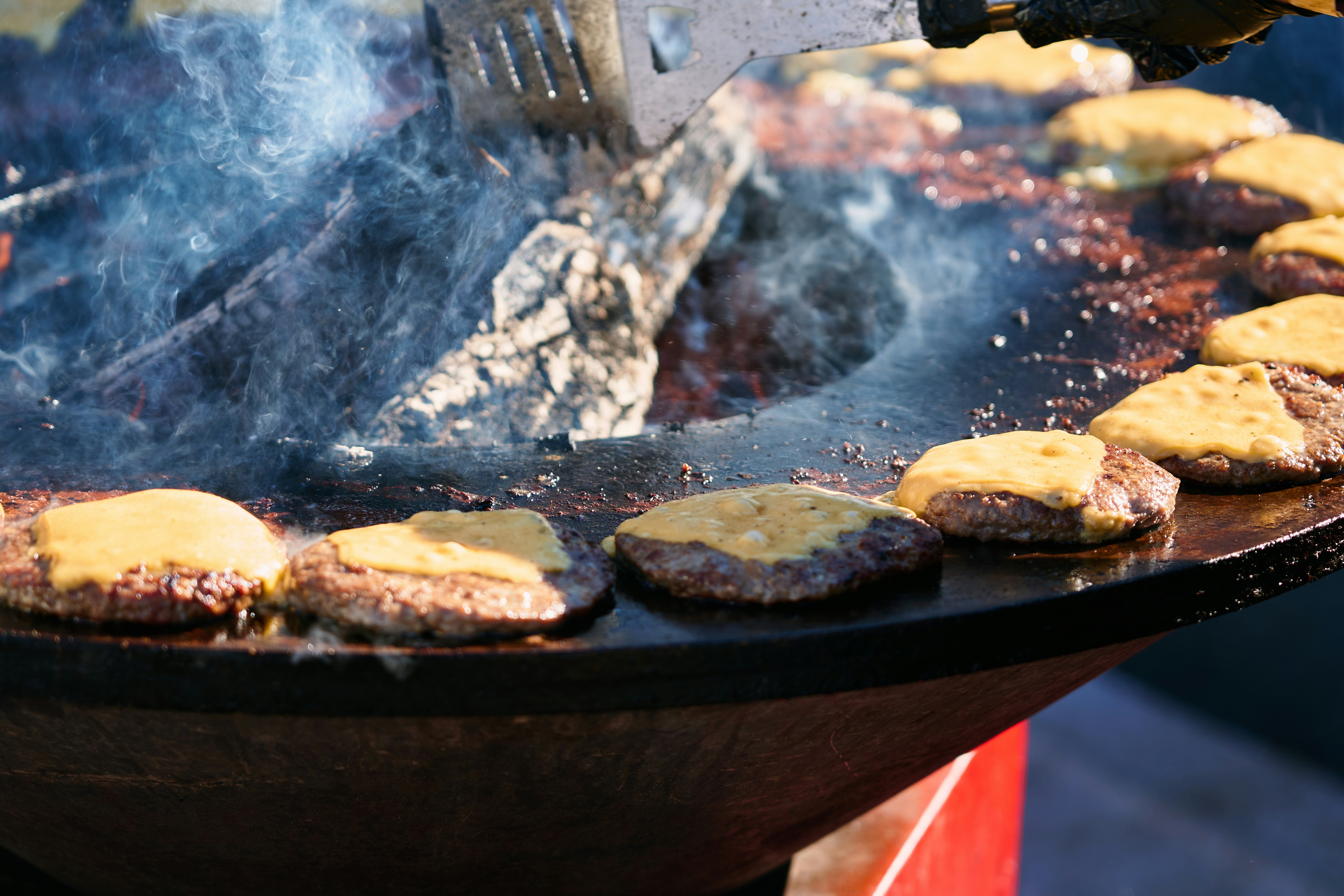 Round Grill of Patties: Char, Smoke, and Ridges