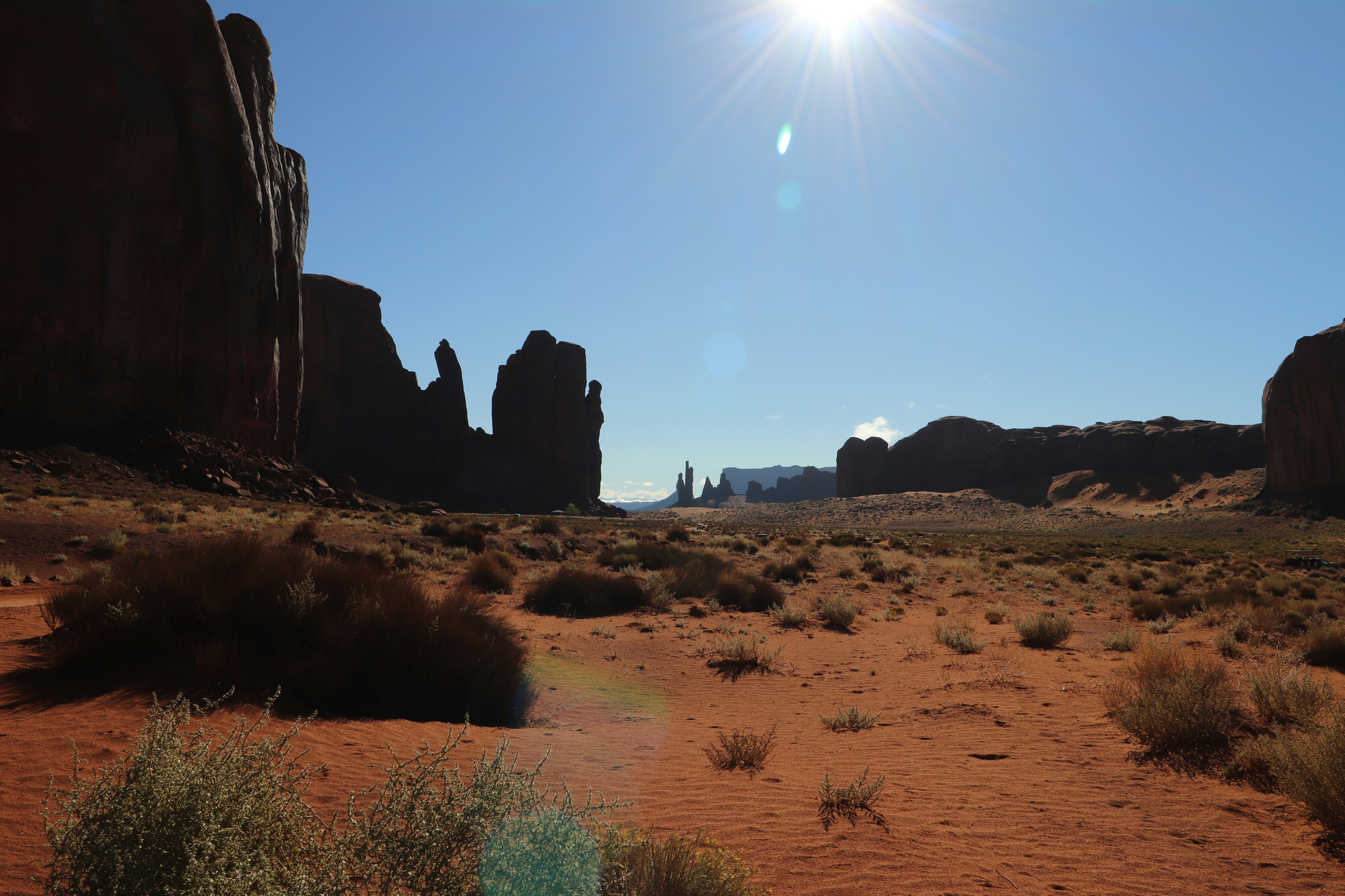 The sun shines brightly over a desert landscape photo – Free Monument ...