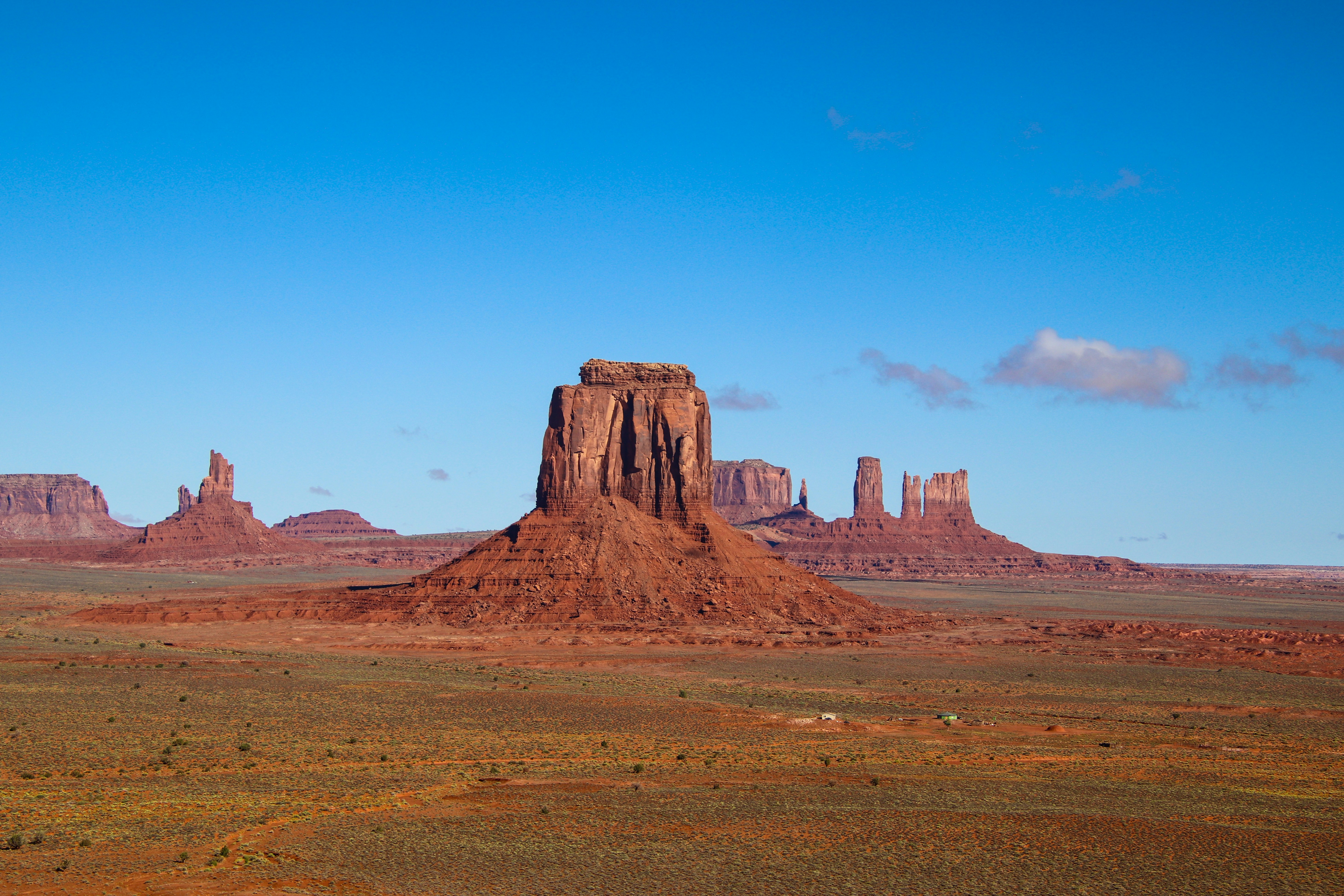 A large rock formation in the middle of a desert photo – Free Monument ...