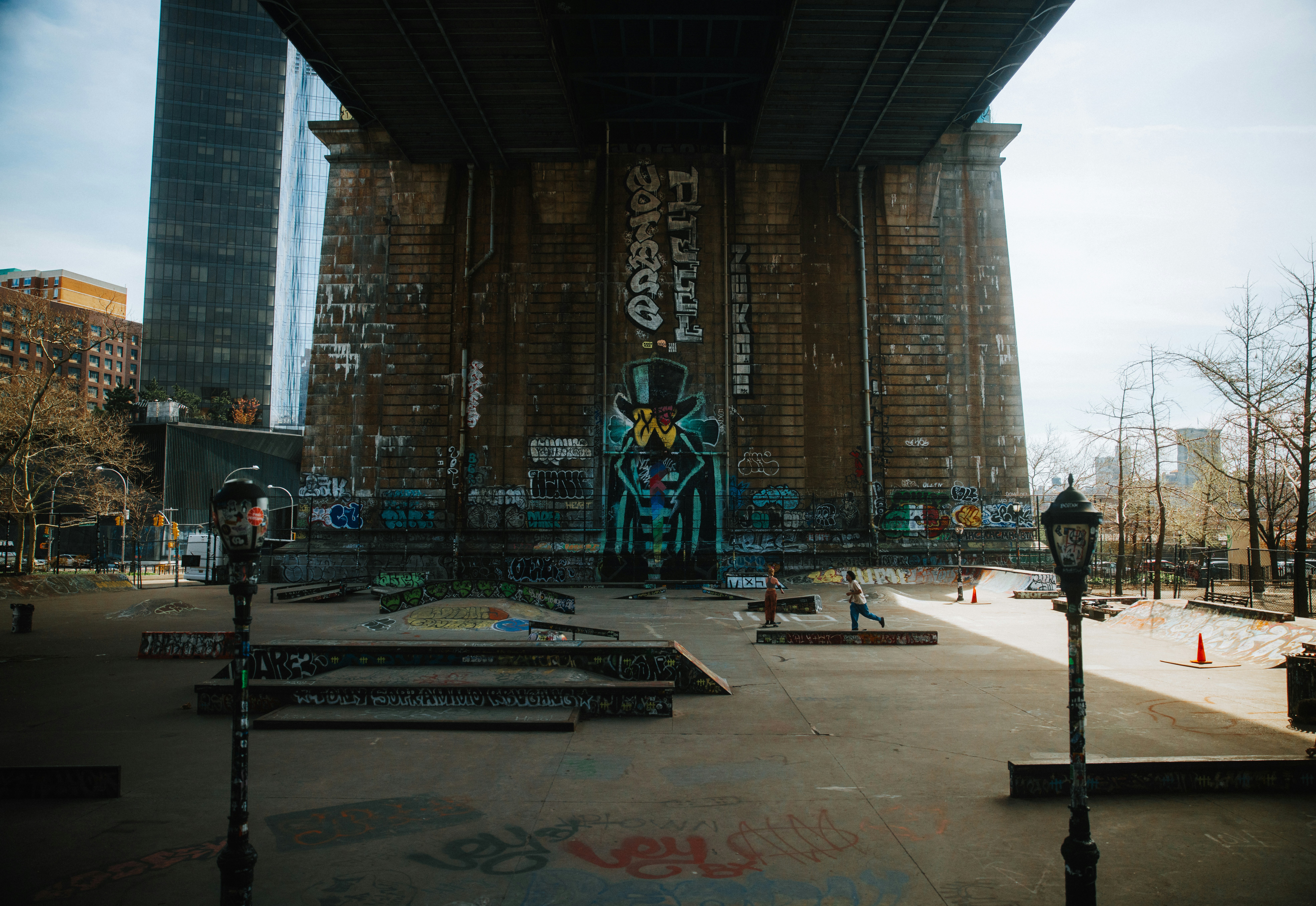 Underpass Graffiti: The Blue Skeleton Guardian Beneath the City