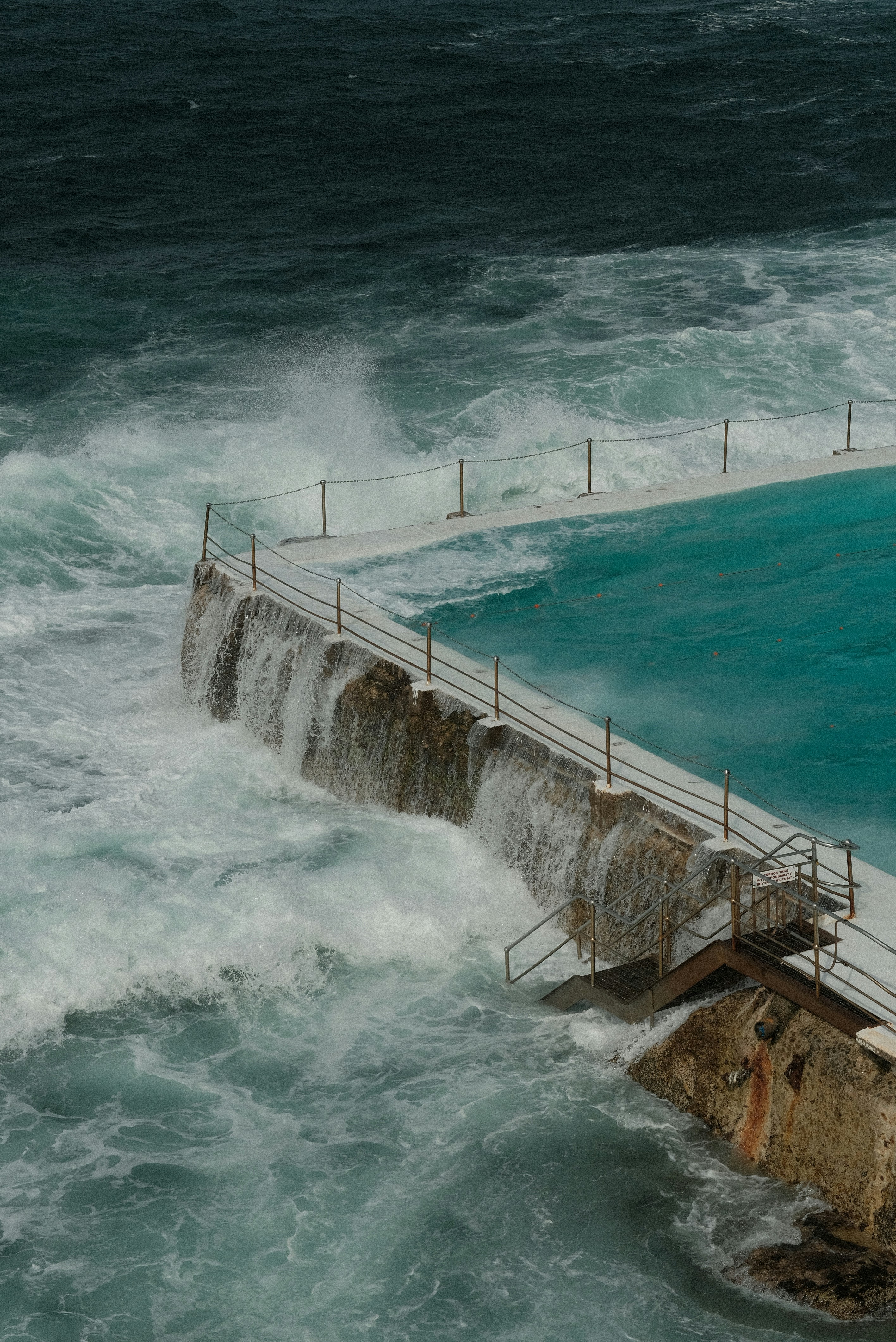 Waves in sydney bondi icebergs pool