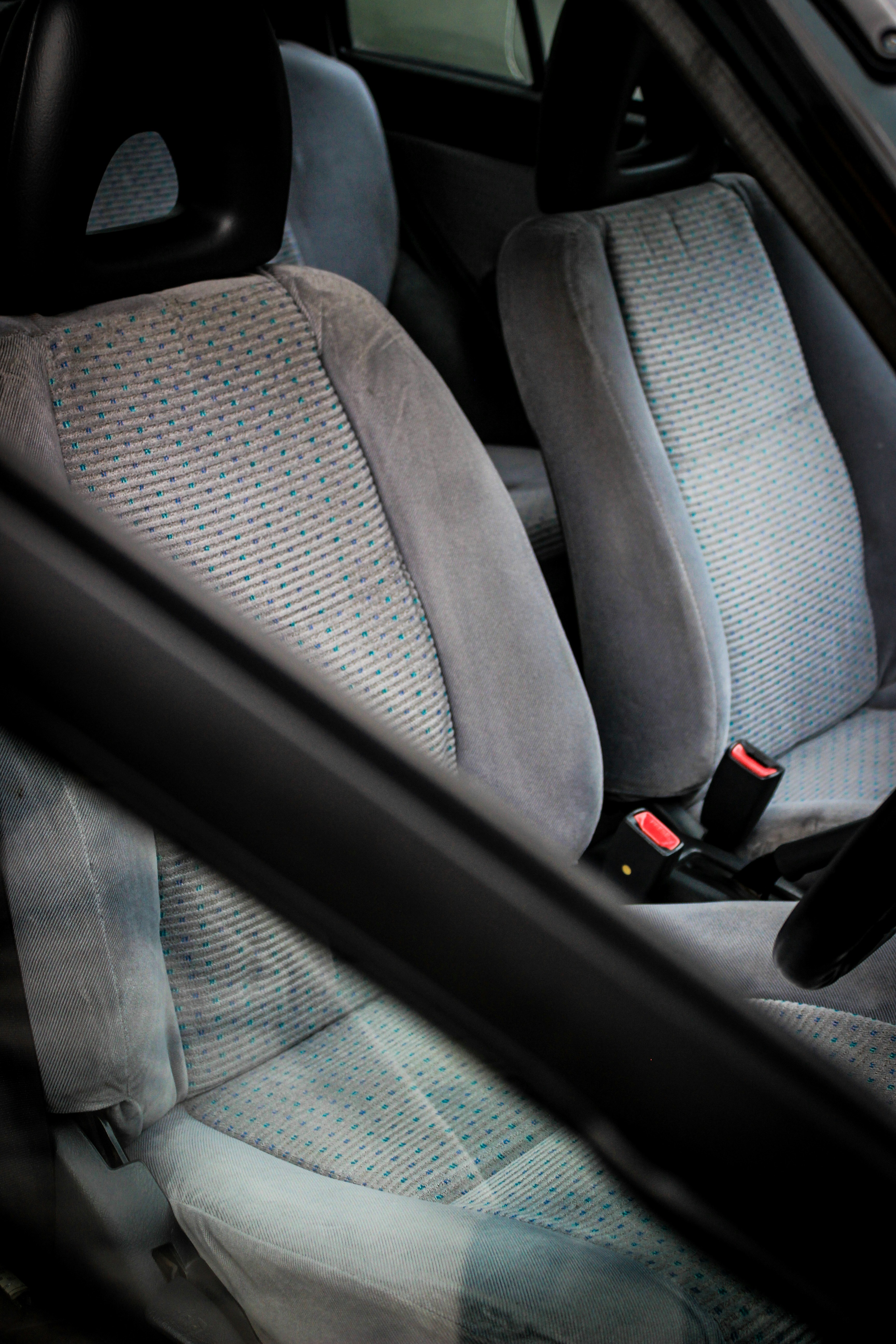 Muted blue upholstery: a quiet glimpse into a car's intimate cabin