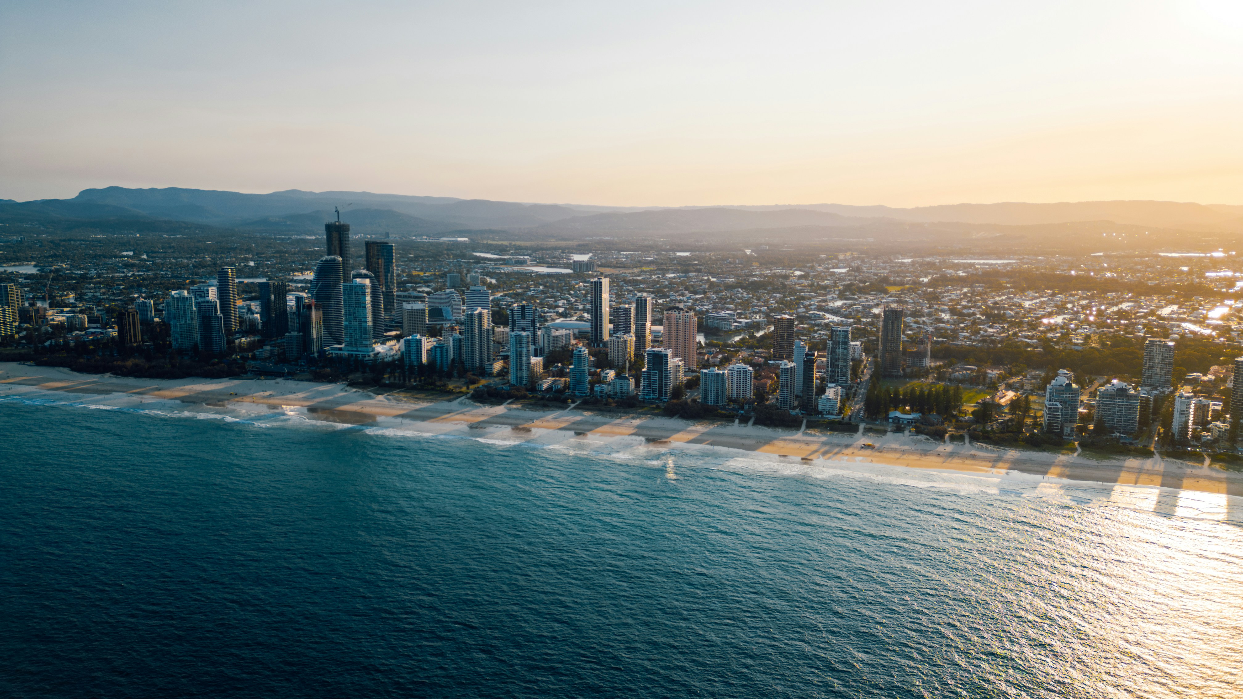 An aerial view of a city next to the ocean photo – Free Australia Image ...