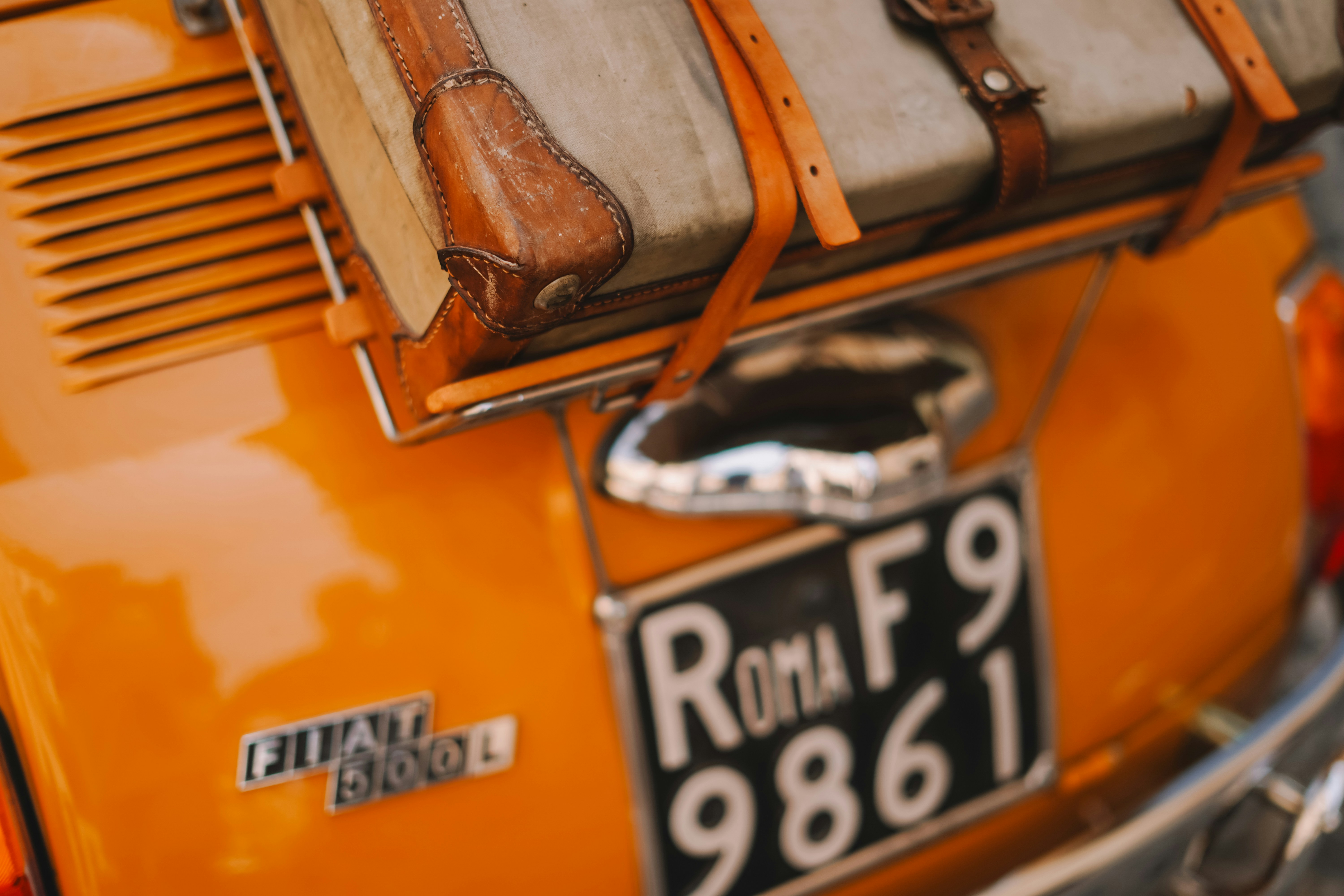 Citrus Carriage: Leather-Lugged Luggage on a Vintage Ride