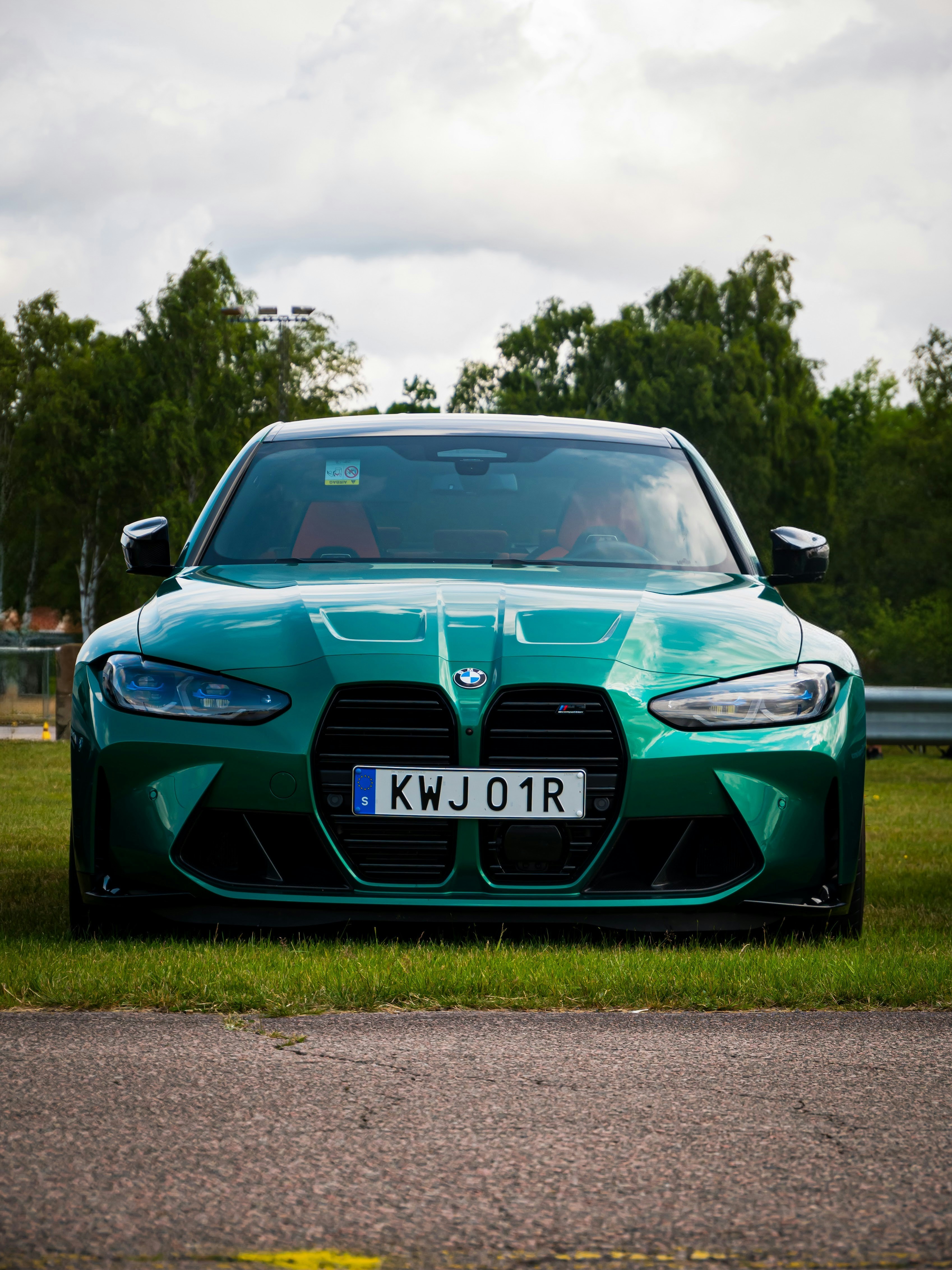 Teal Frontline: The BMW Kidney Grilles Command the Frame
