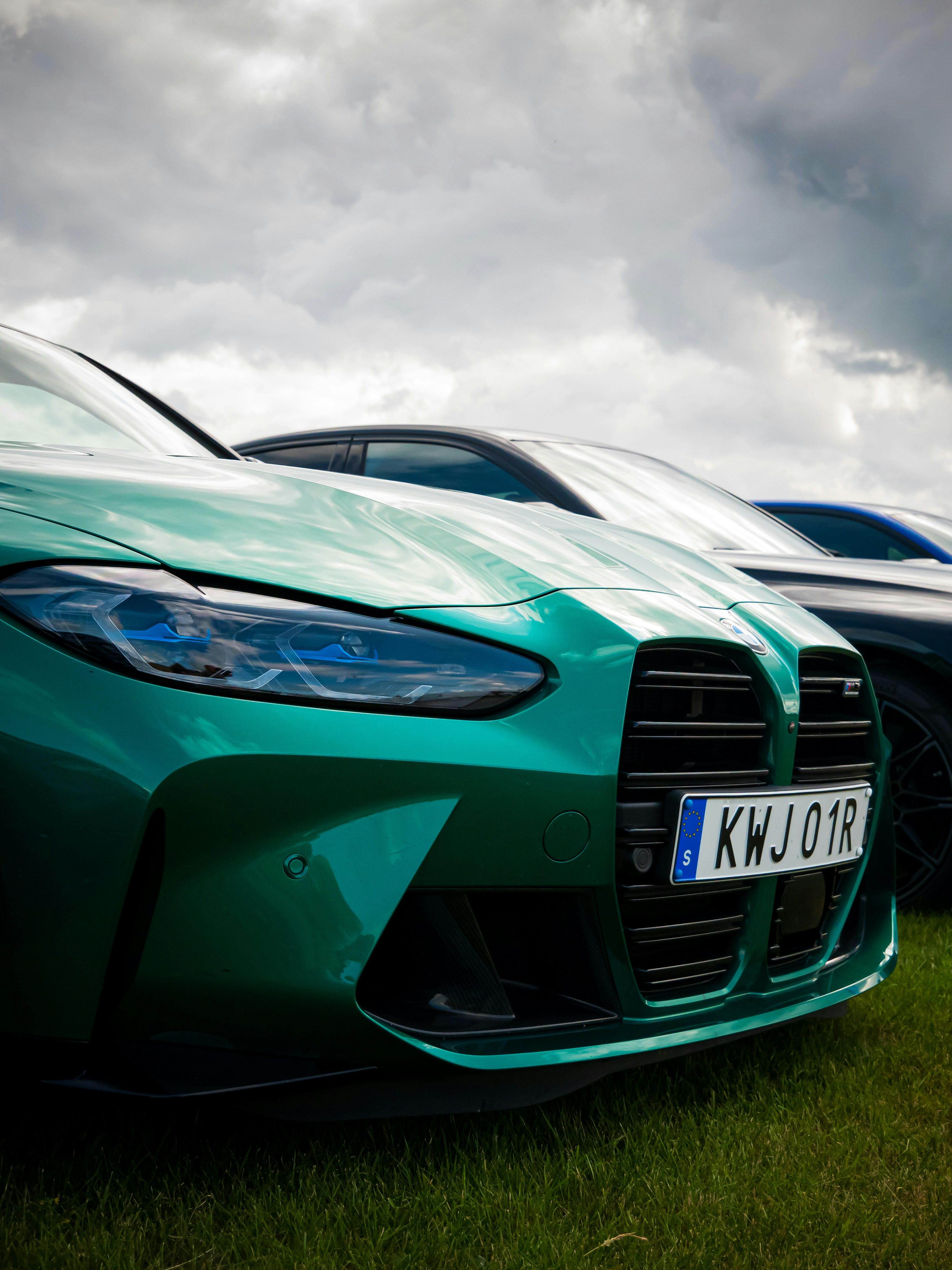 Emerald Grille: A Low-Angle Portrait of a Green Supercar