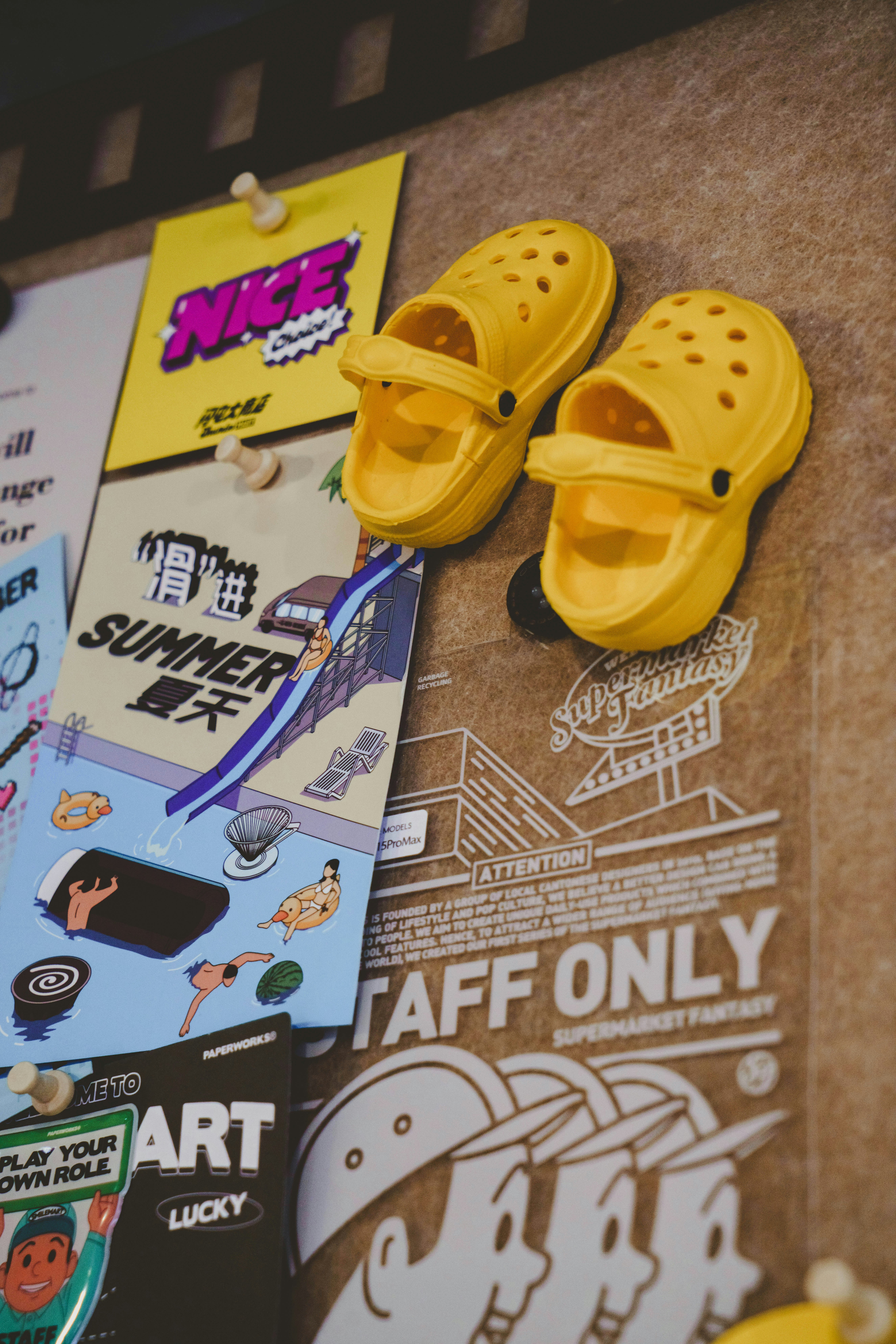 Bright Yellow Slip-Ons and Playful Posters: A Casual Corner of Creative Wall Art